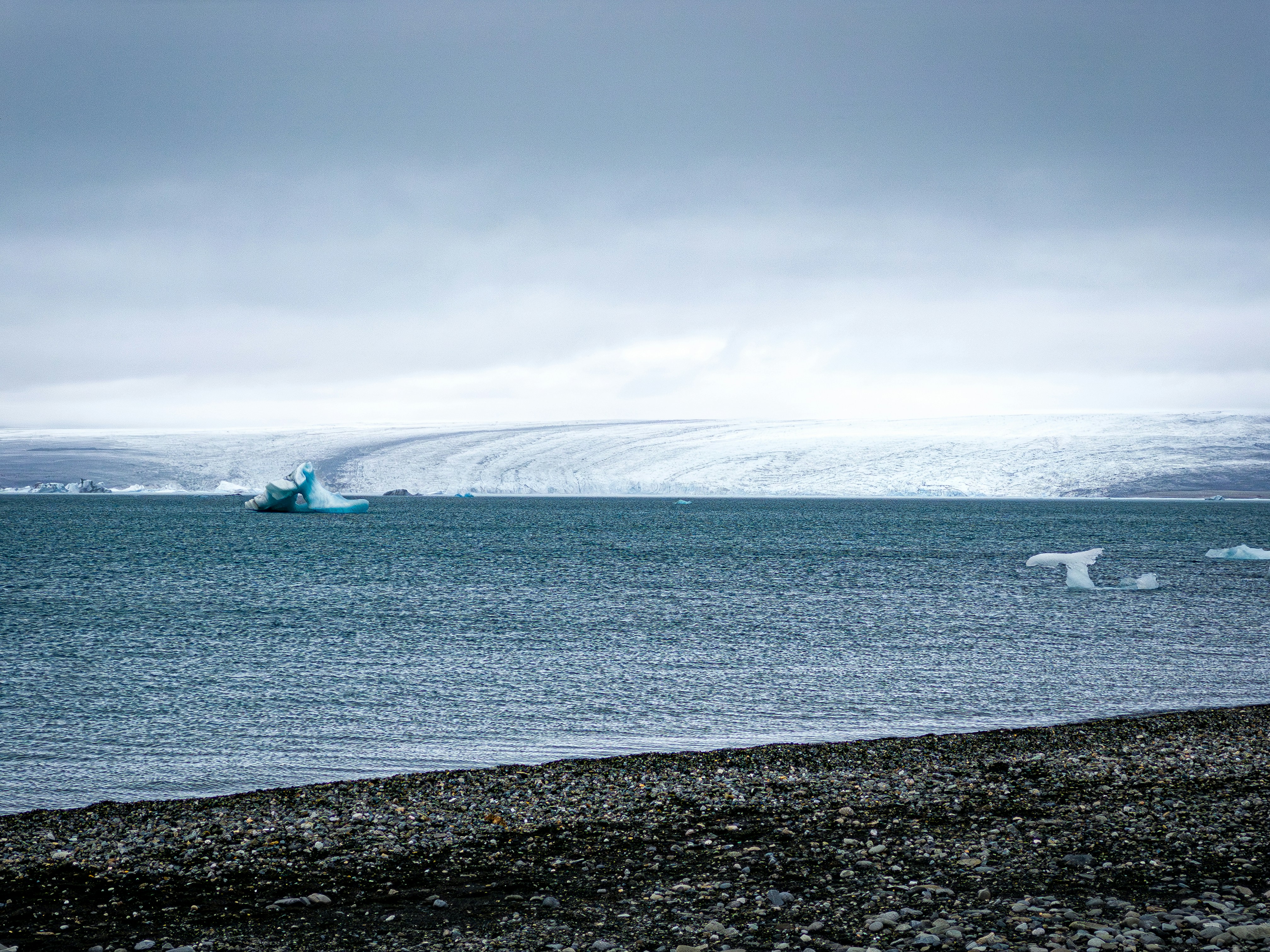 Glacial Shoreline under a Leaden Sky