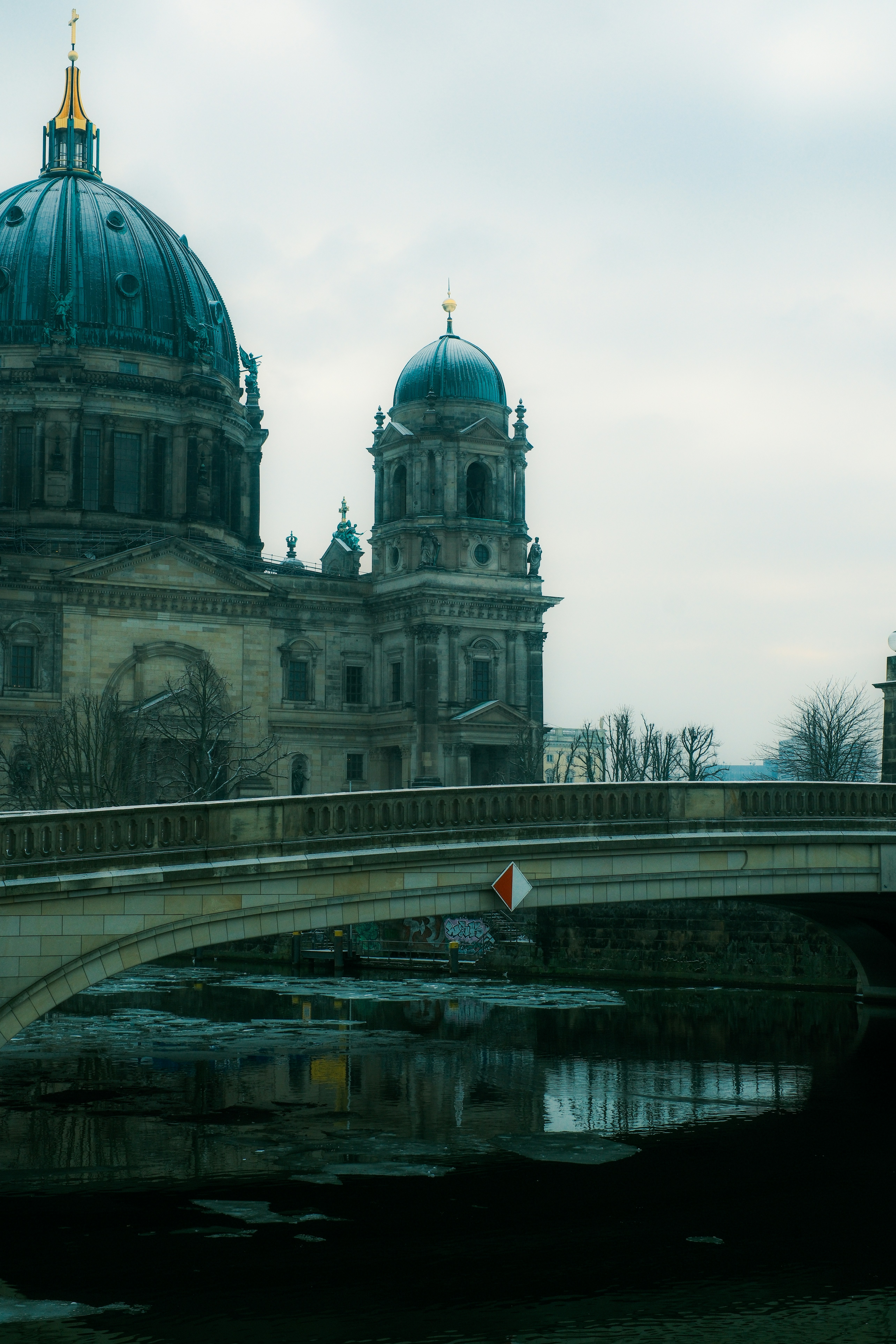 Dome and Bridge Over a Quiet River