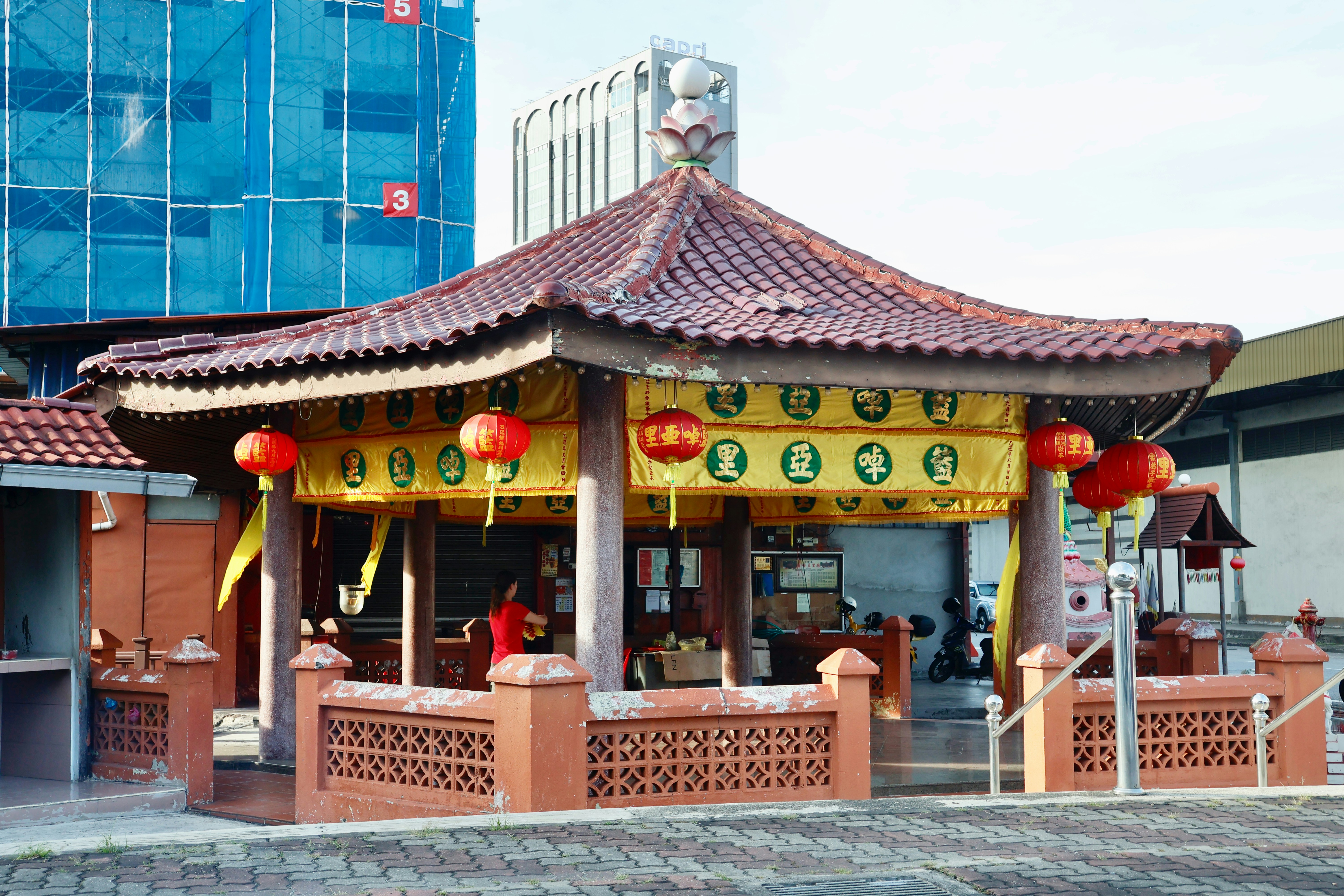 Temple Courtyard in a Modern-Porticoed Street