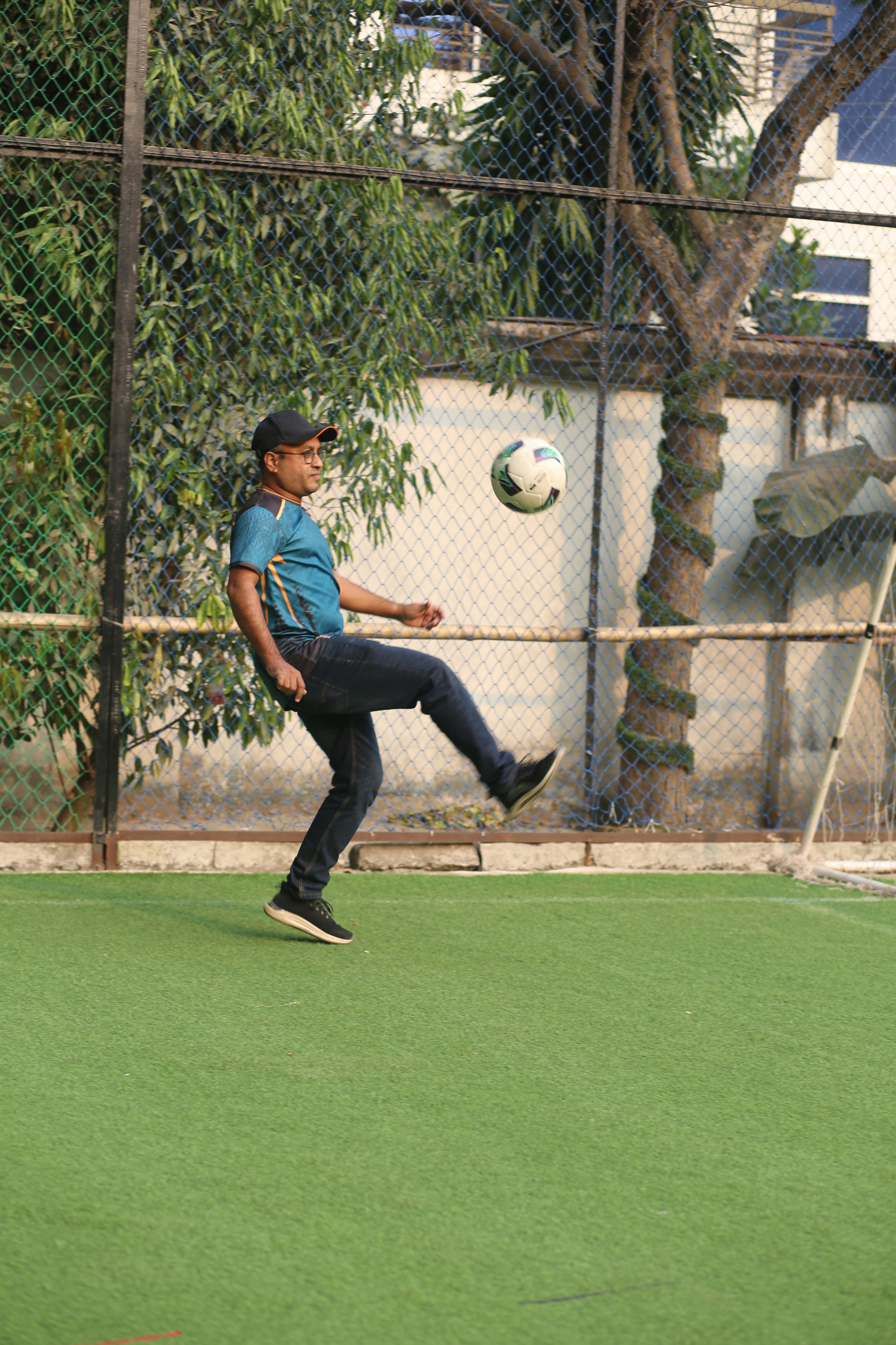 Midair Play: A Soccer Moment on the Artificial Green