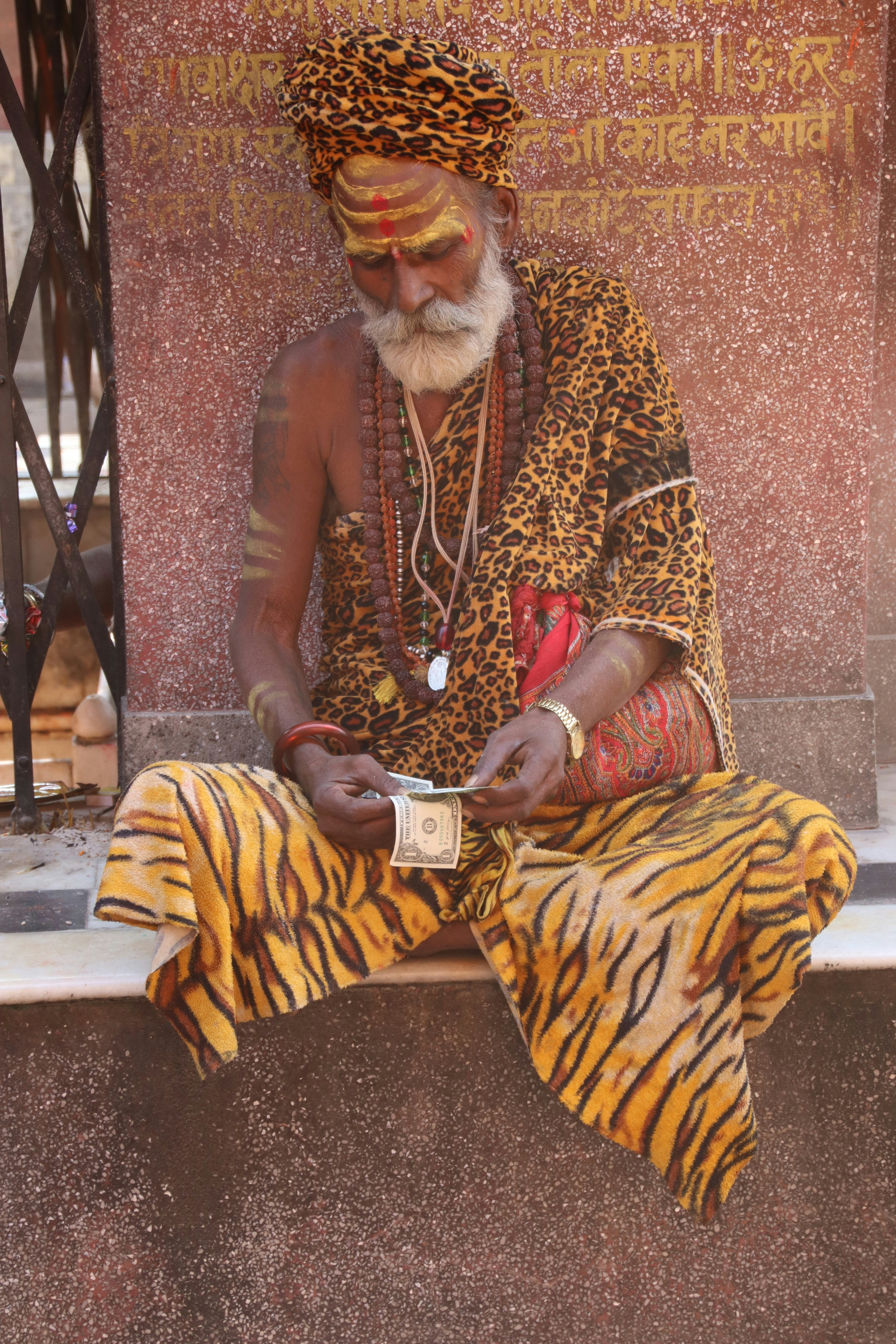 The Seated Sage: Rituals, Robes, and Ruled Currency
