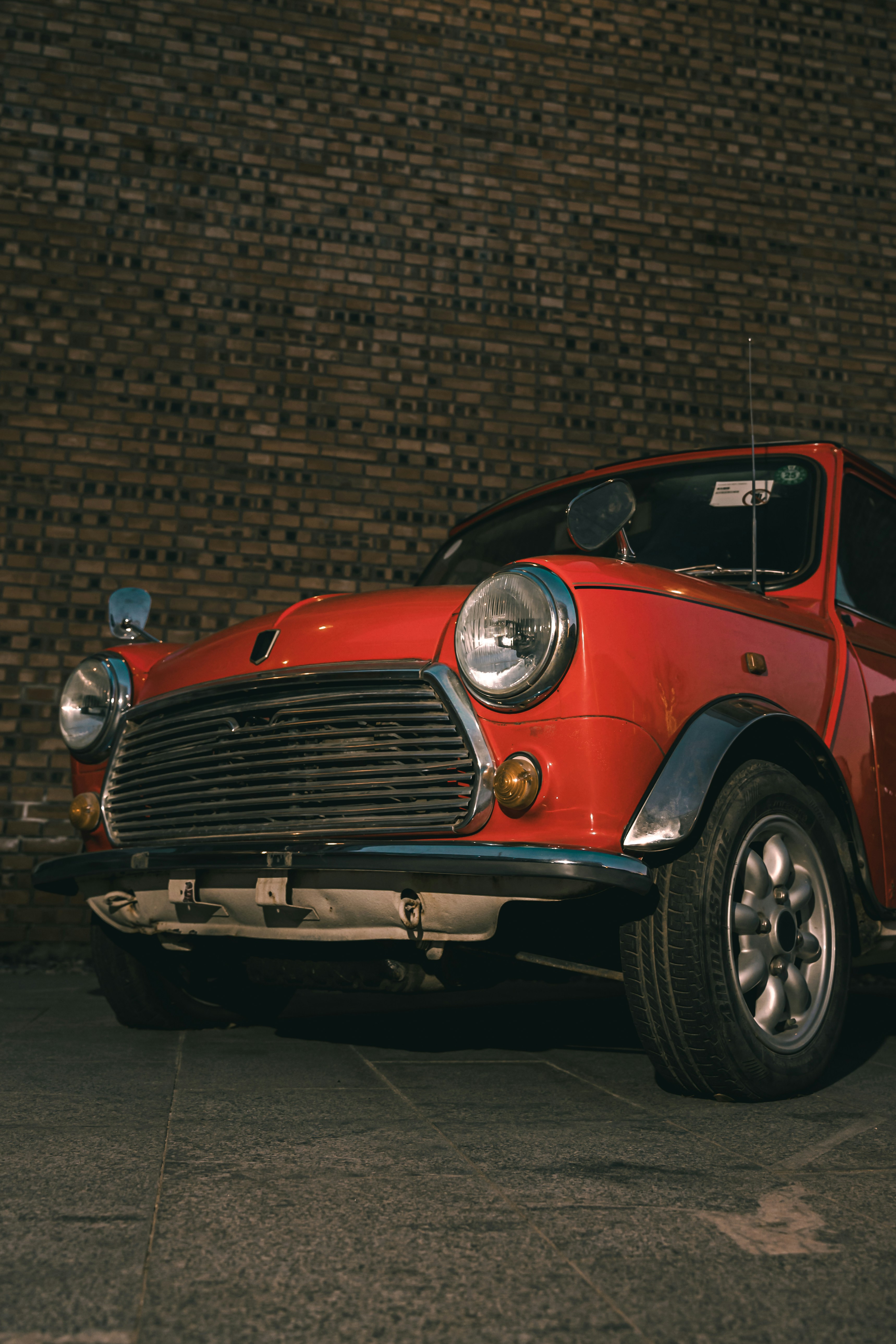 Red Classic: The Curved Grin of a Vintage Mini Cooper