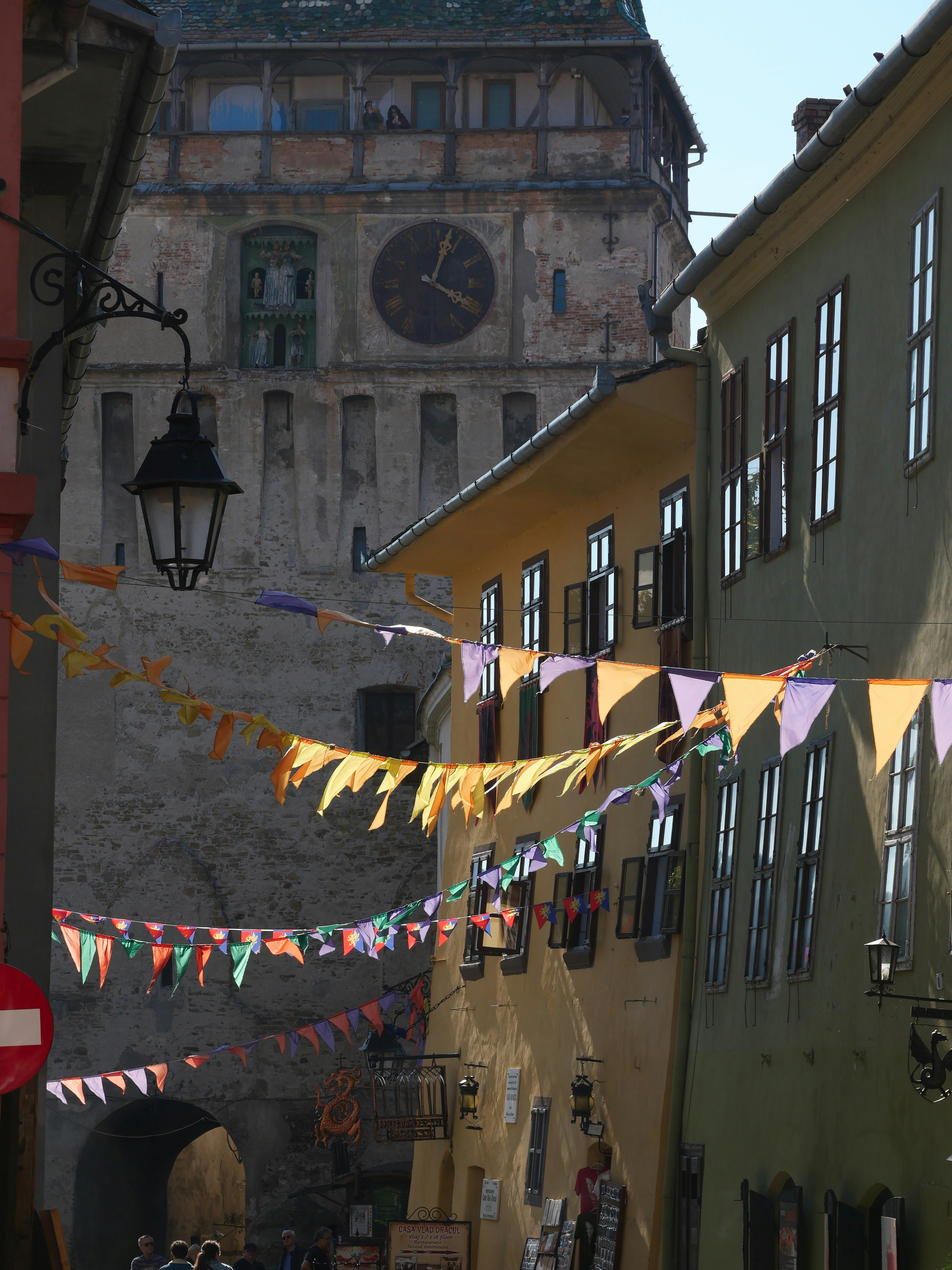 Cobbled Street Festival Under a Clocktower
