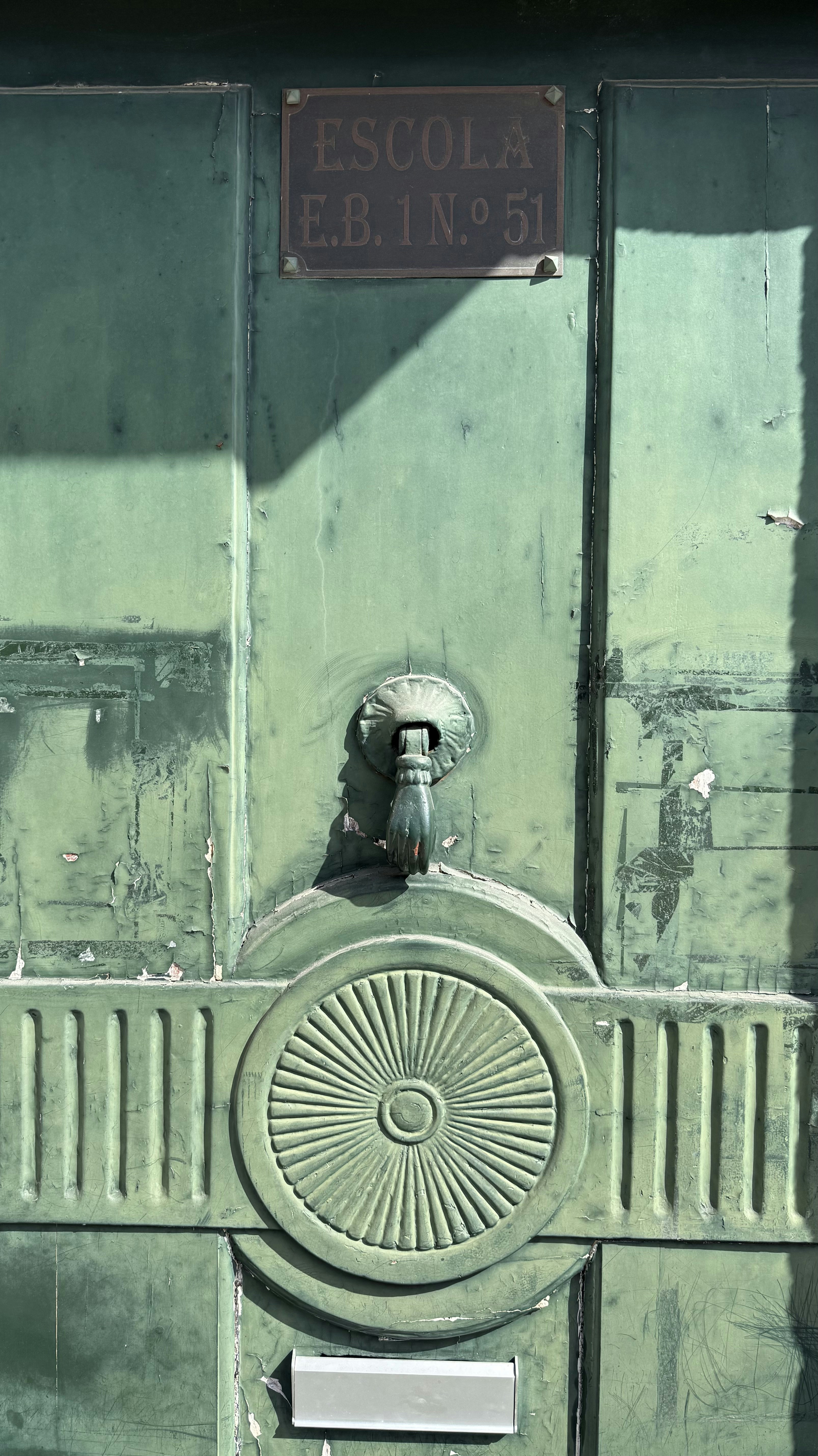Green Door Halo: A Sculpted Focus on a Weathered Entrance