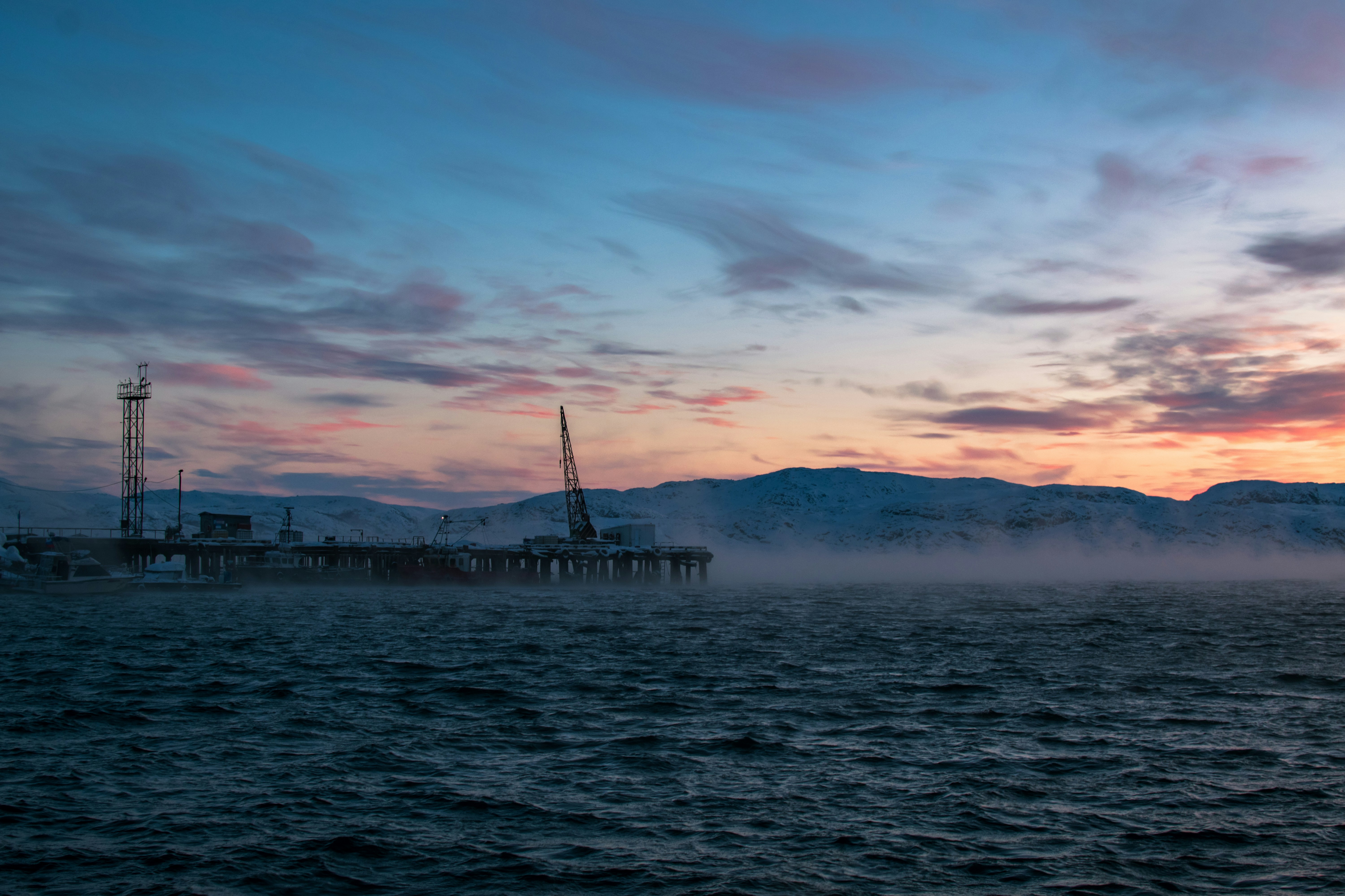Dusk over the Pier: Mist on the Water