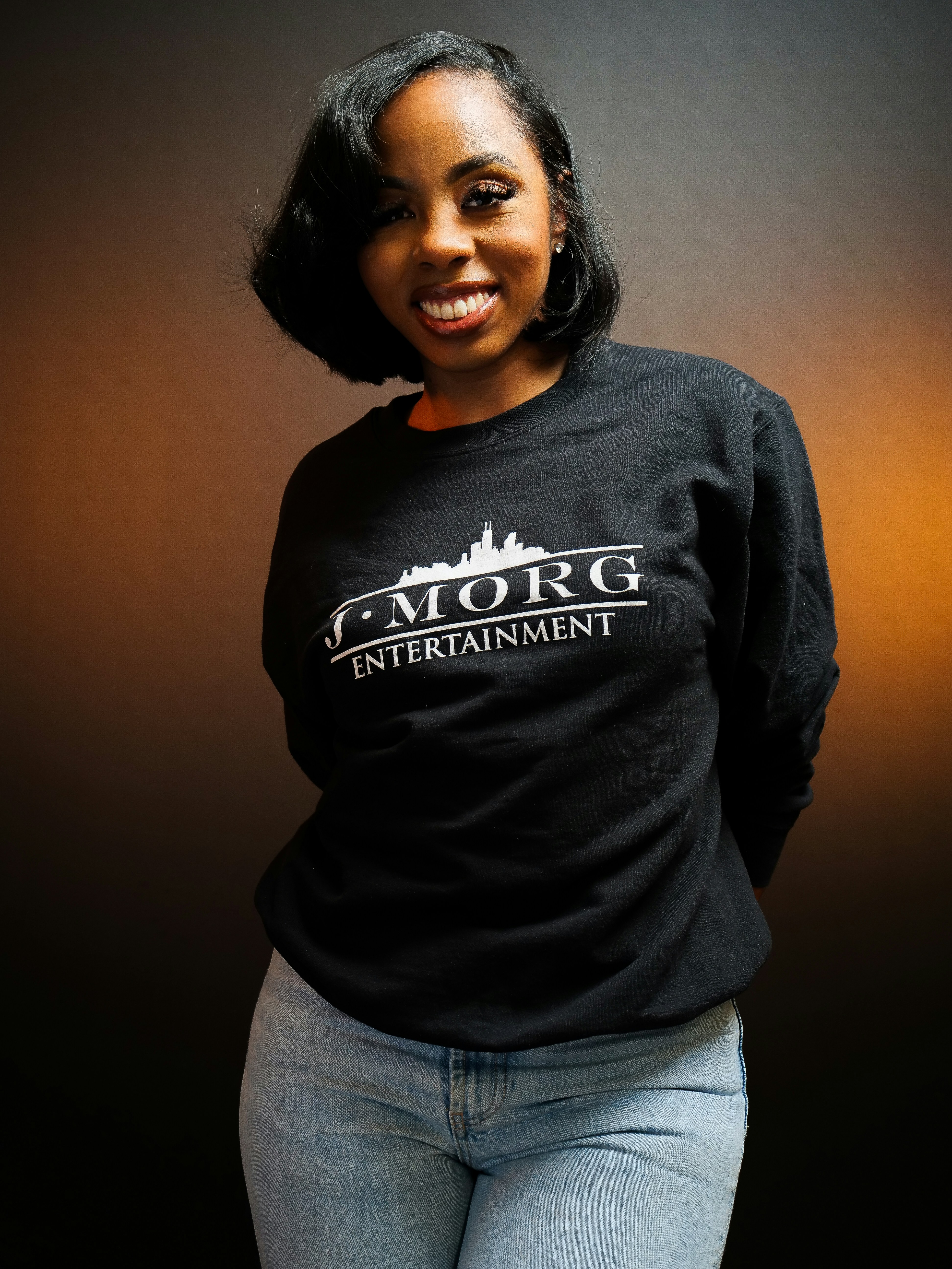 Smiling Confidence: A Portrait in Warm Studio Light