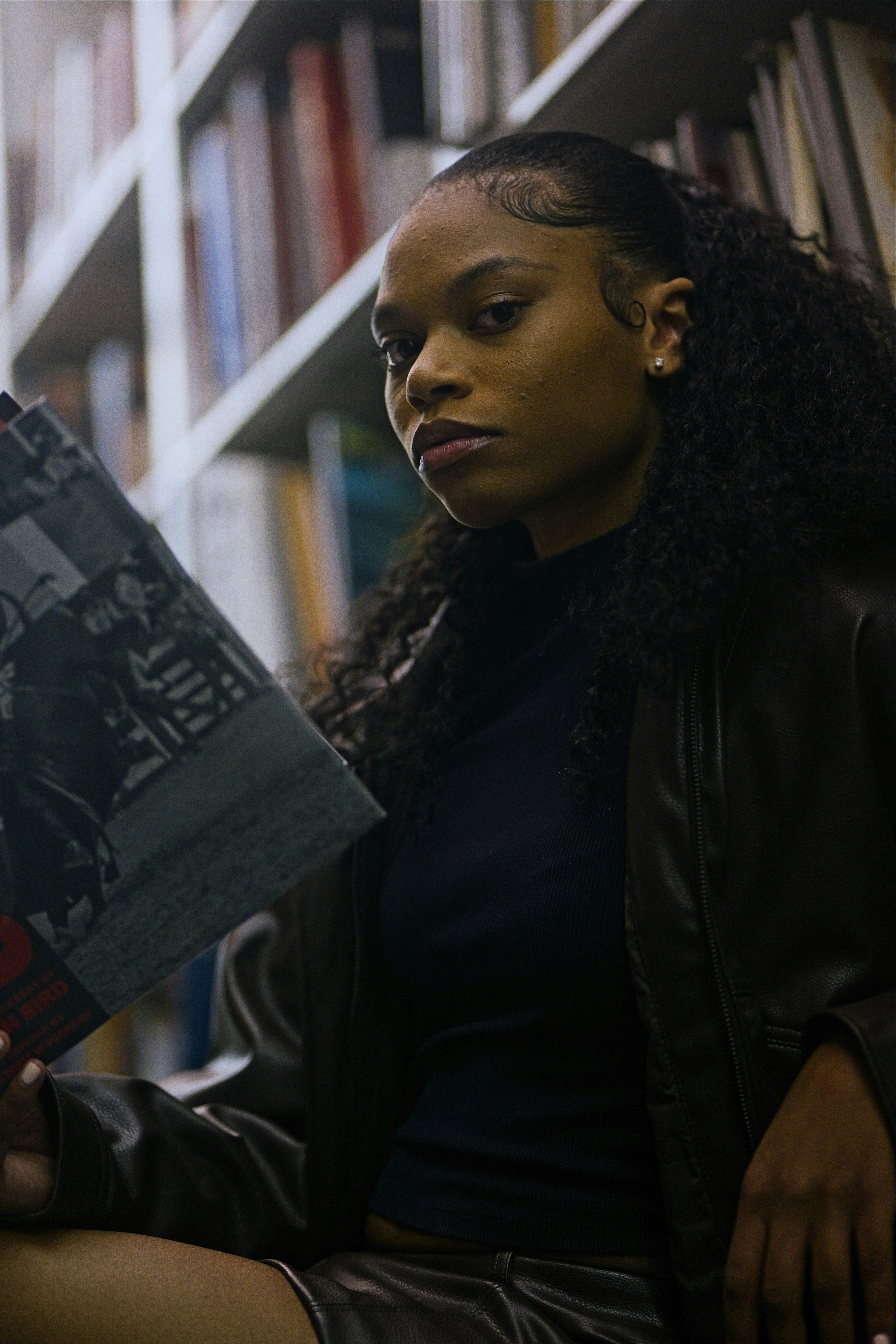 Library Portrait: A Quiet Look Over a Vinyl-Edge Obsidian