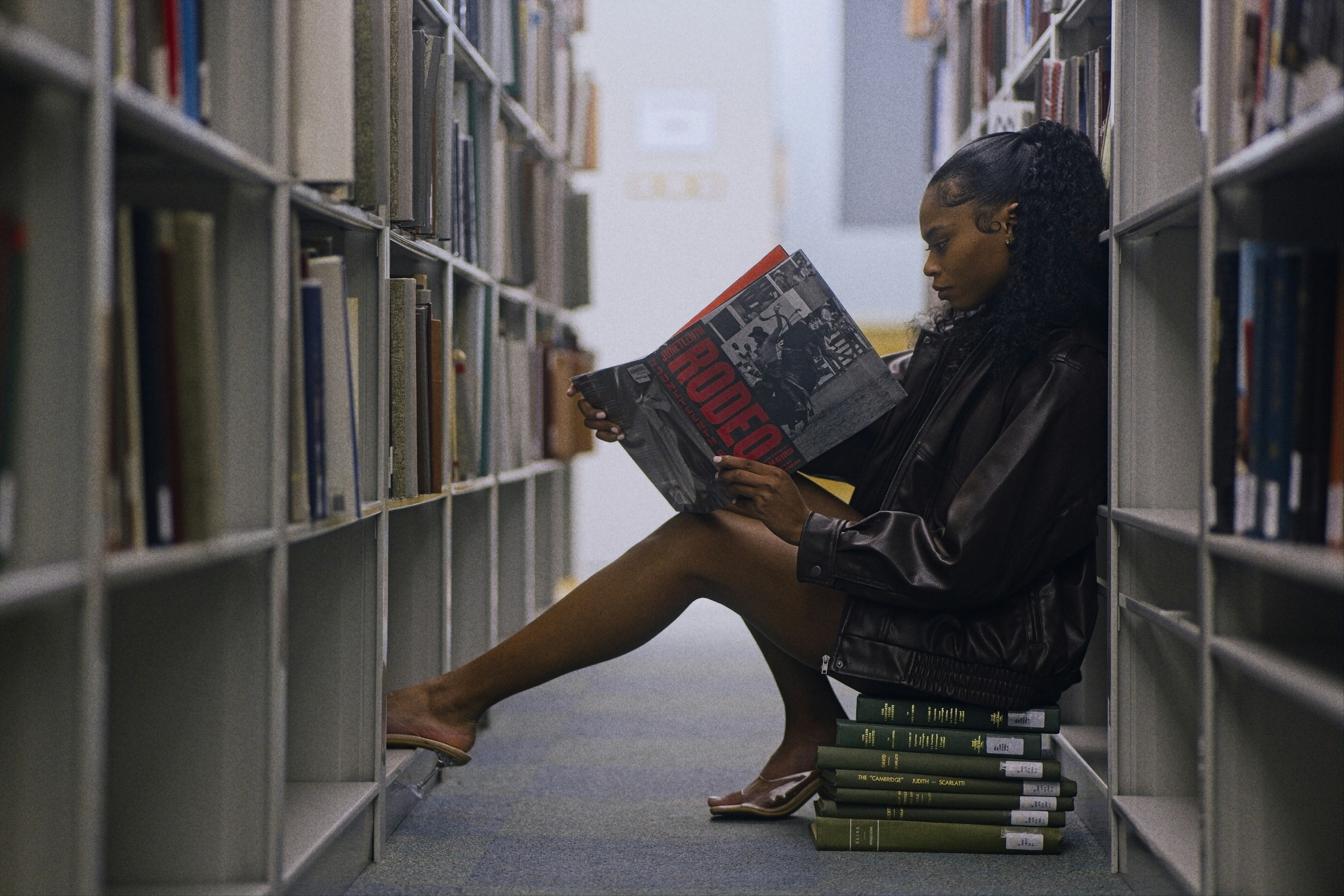 Reading Repose: A Quiet Moment Between Aisles
