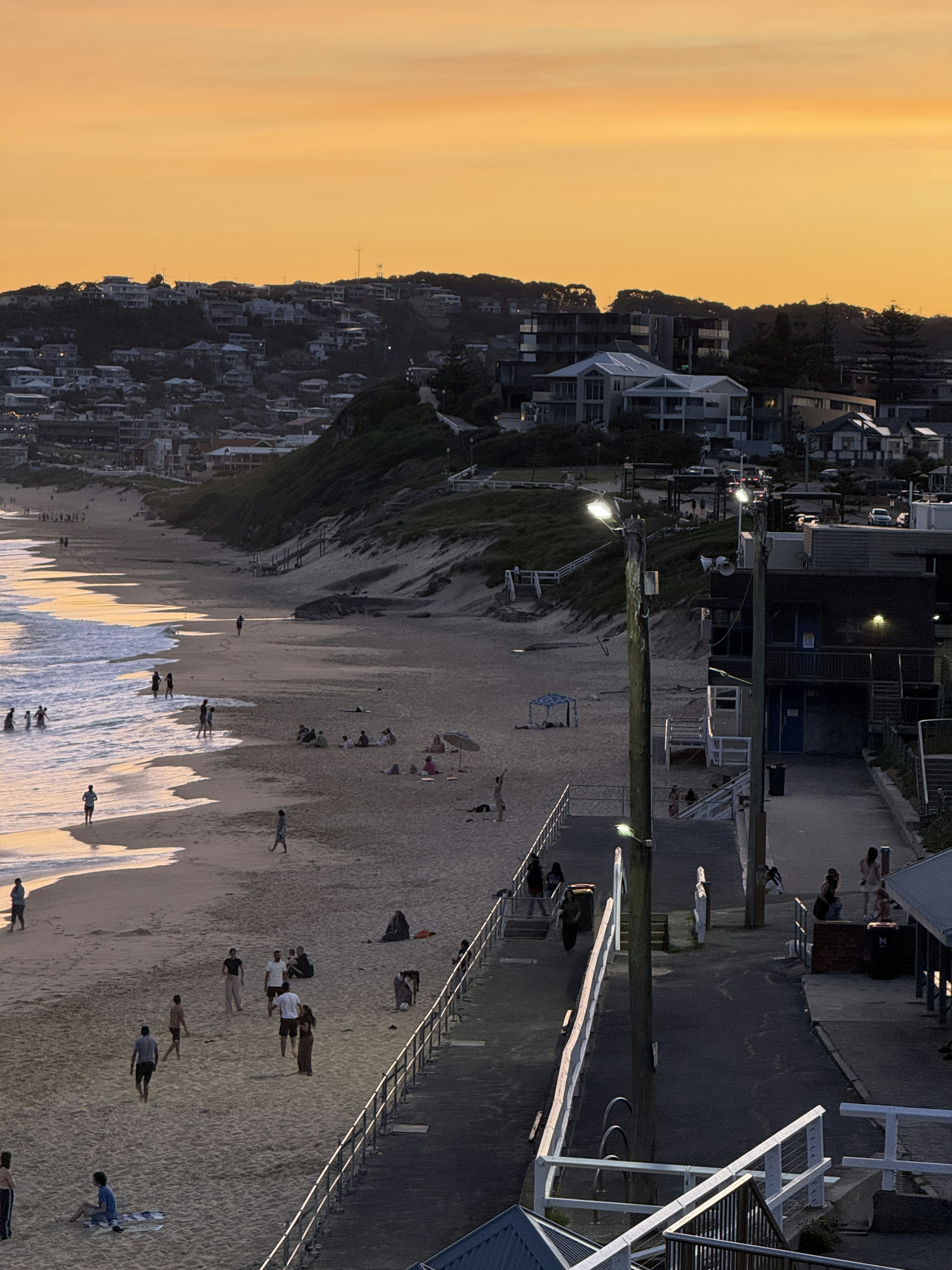 Sunset Walk Along a Coastal Cliff Town