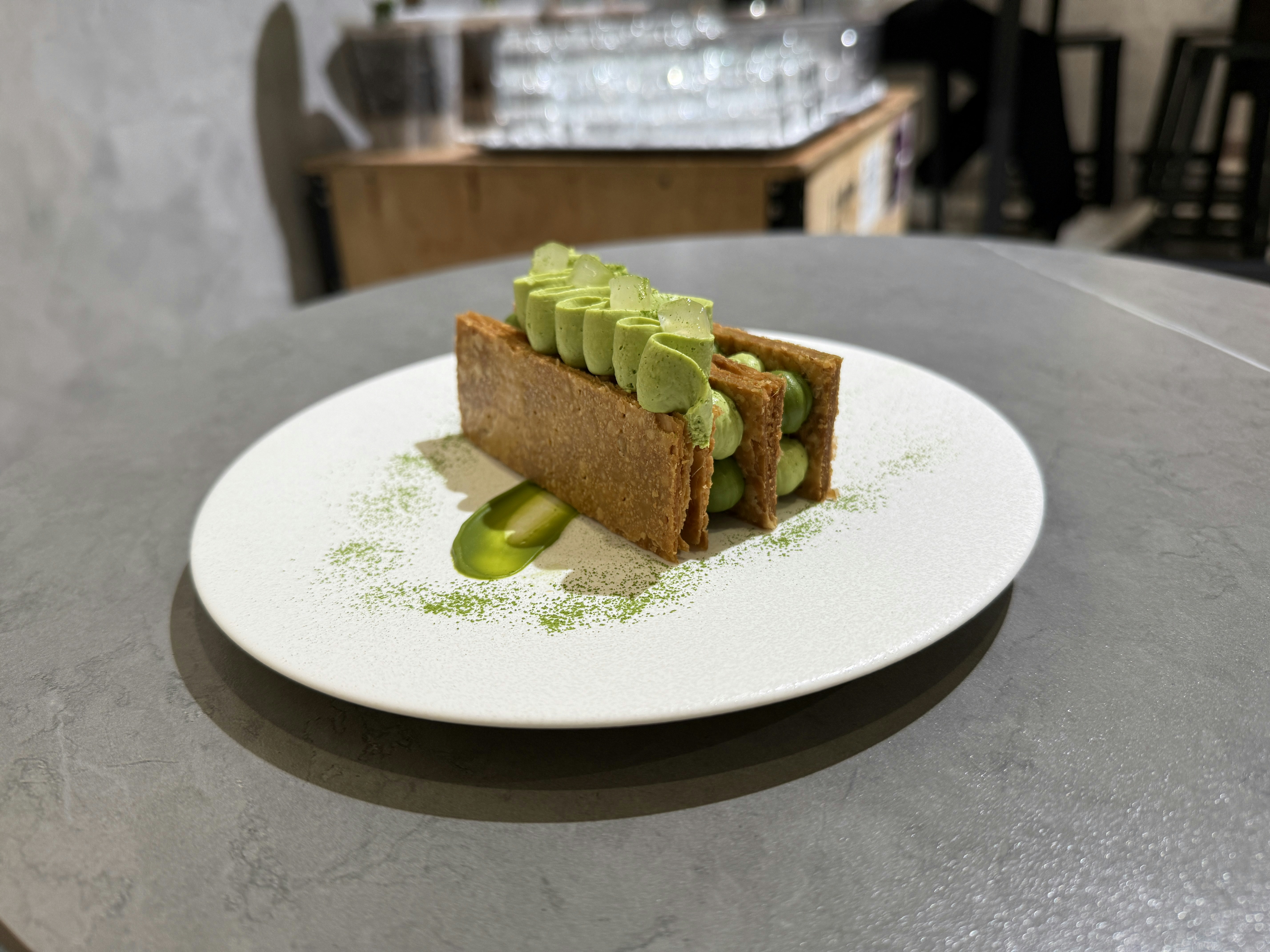 Verdant Mousse on a Golden Crust: A Green Tea Tart Delivered Like a Modern Sculpture