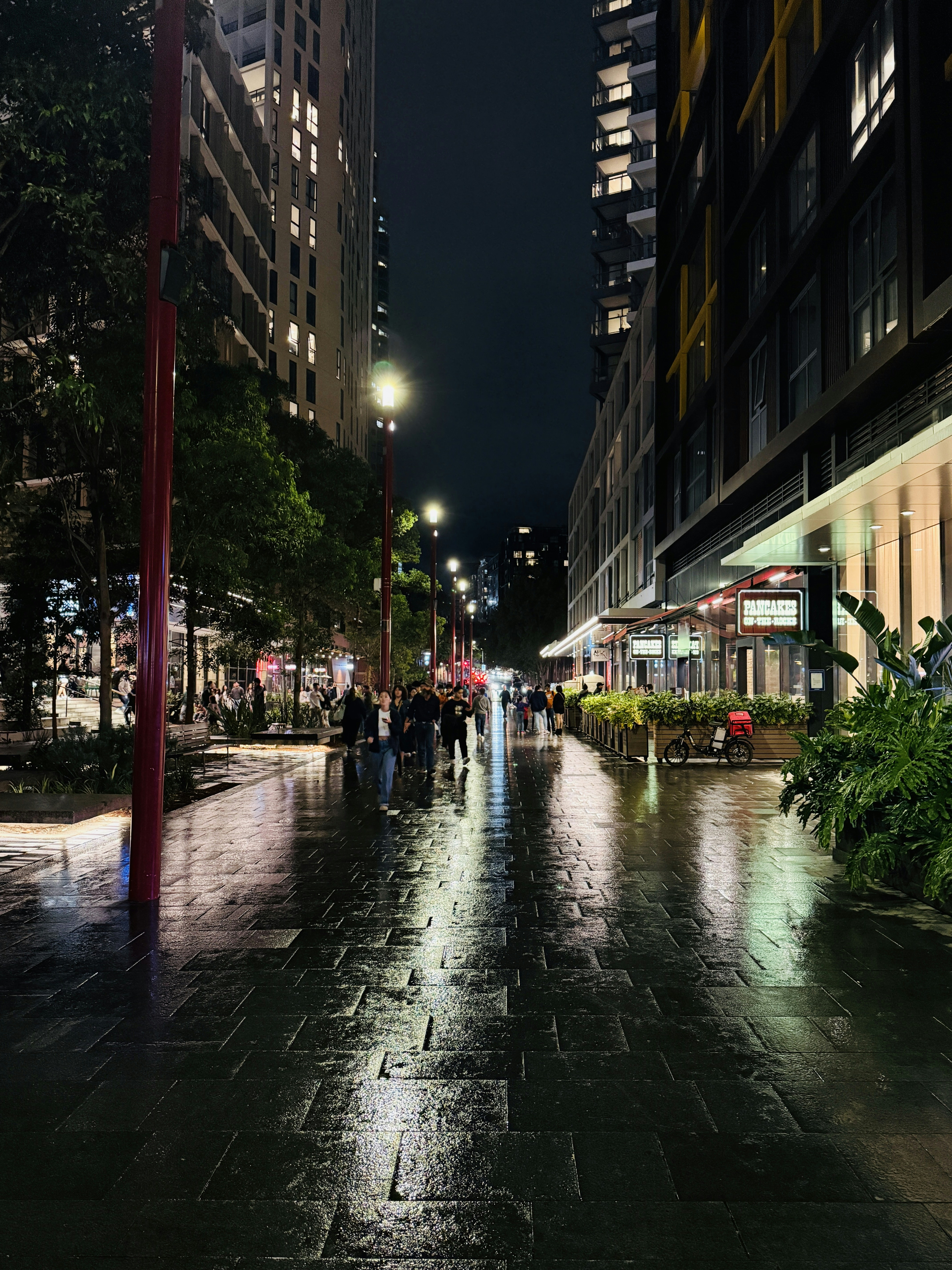 Rain-Slick Boulevard Nights: Neon Reflections on a City Walk
