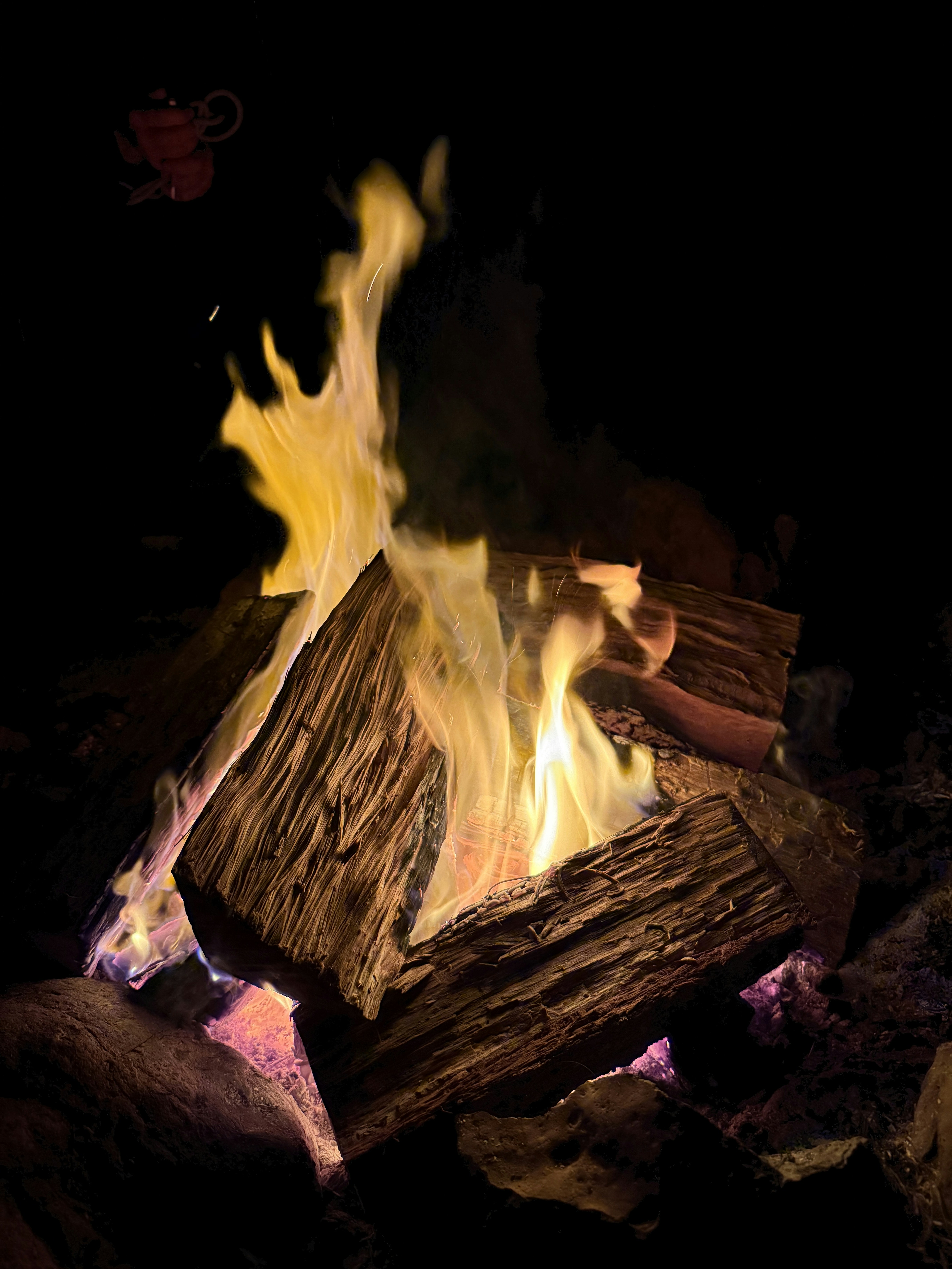 Crackling Hearth at Midnight: Logs Forging Light