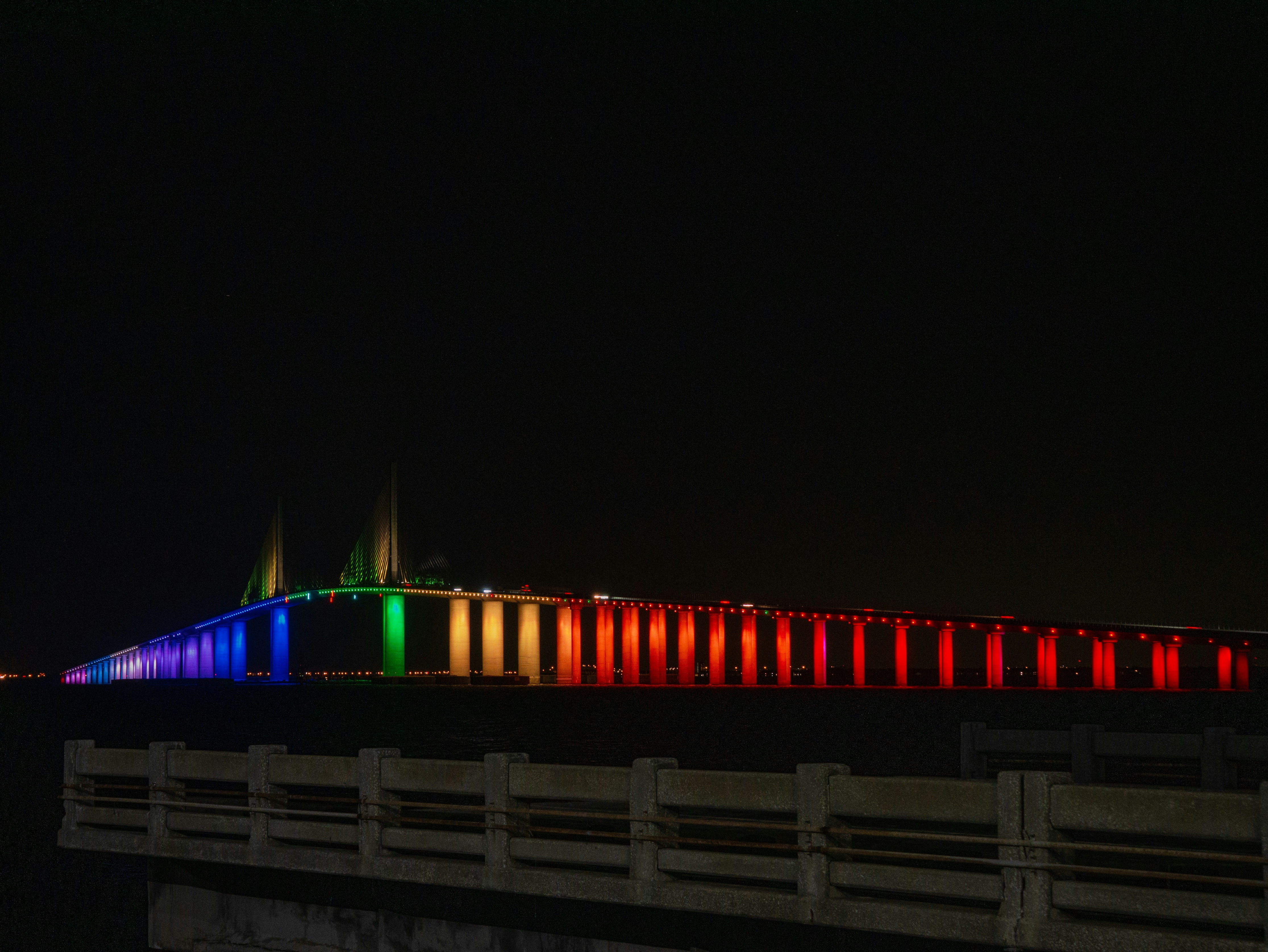 Rainbow Bridge at Night: A Digital Arc of Color Across the Dark