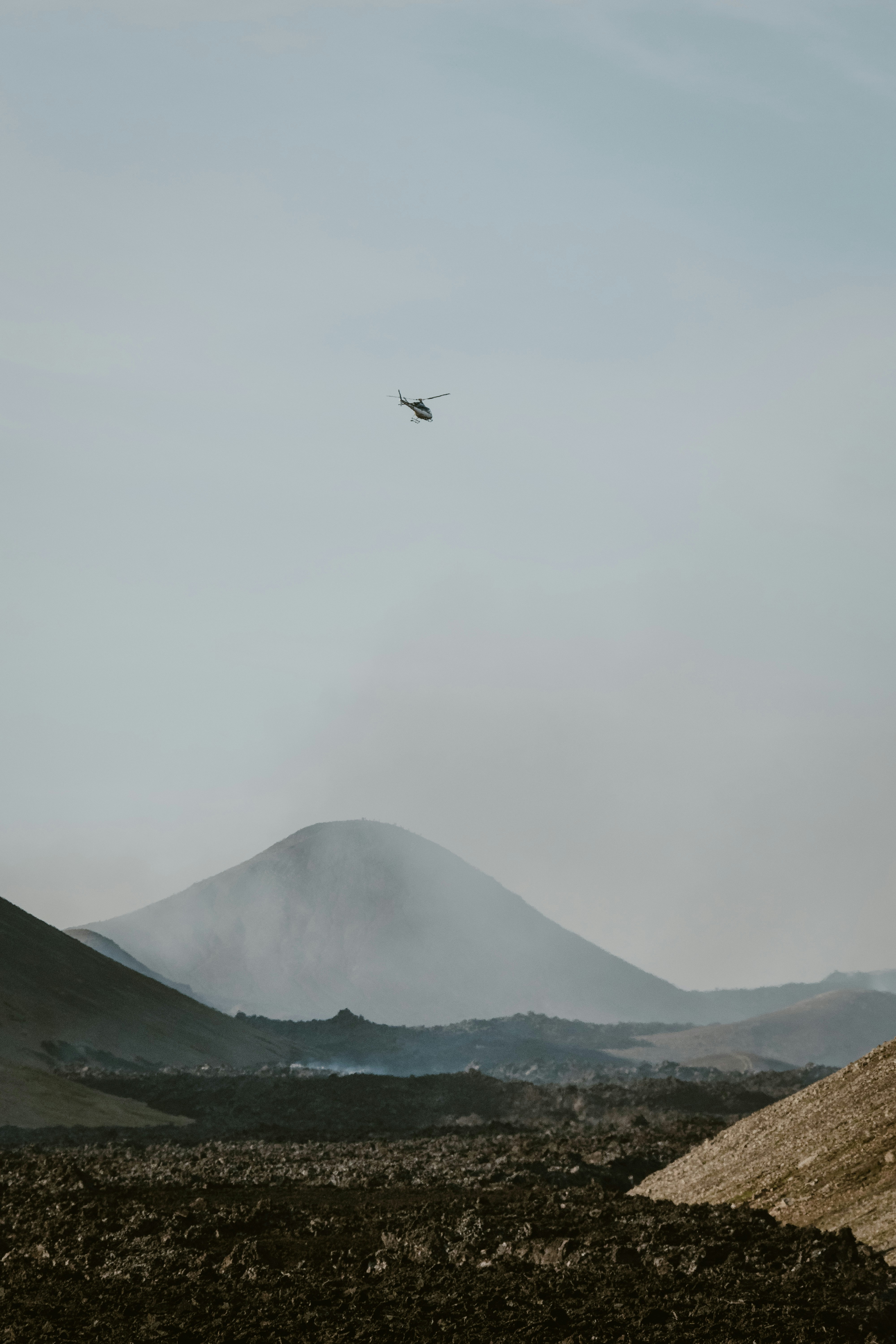 Highland Helix: A solitary helicopter over volcanic dunes