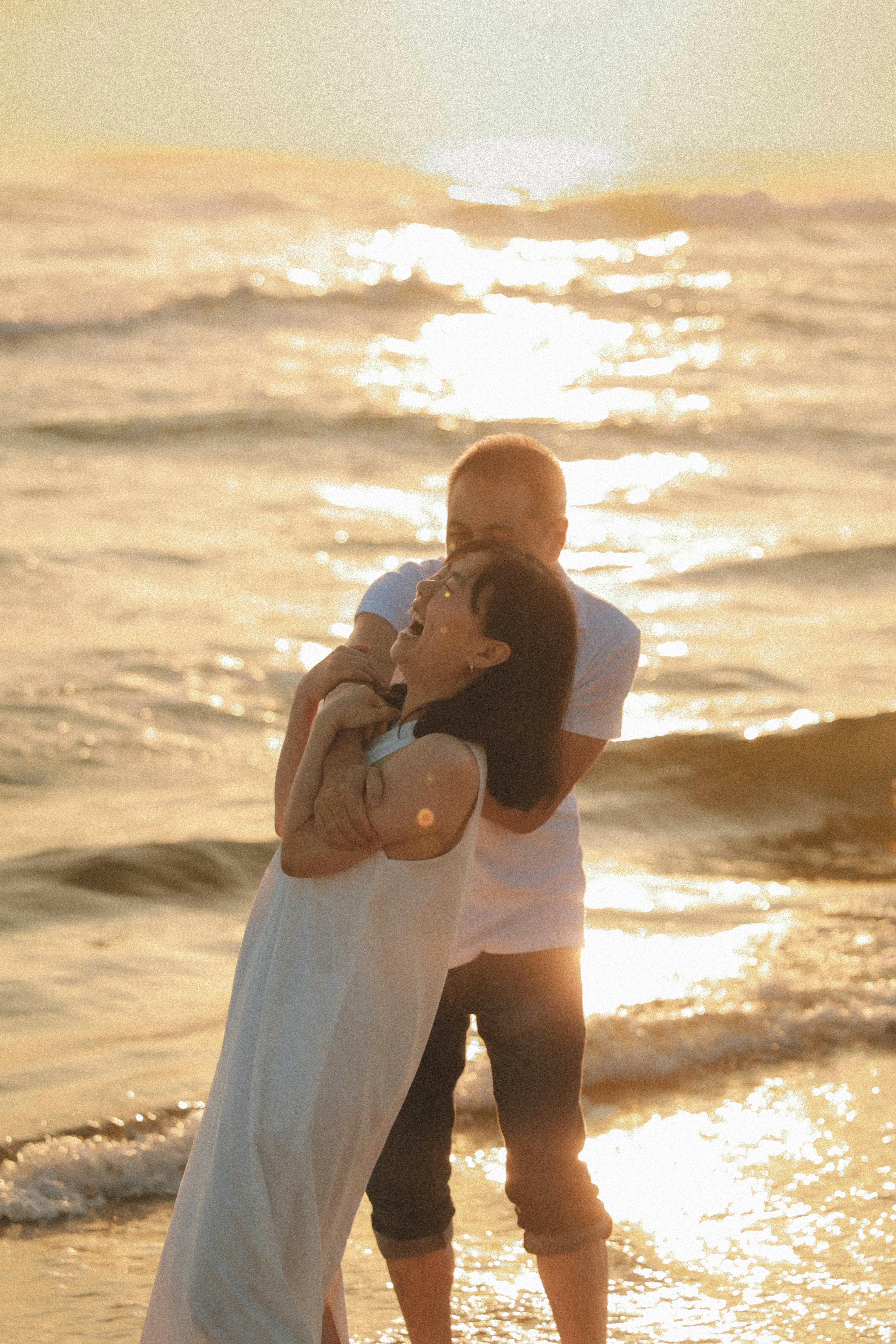 Sunset embrace by the sea