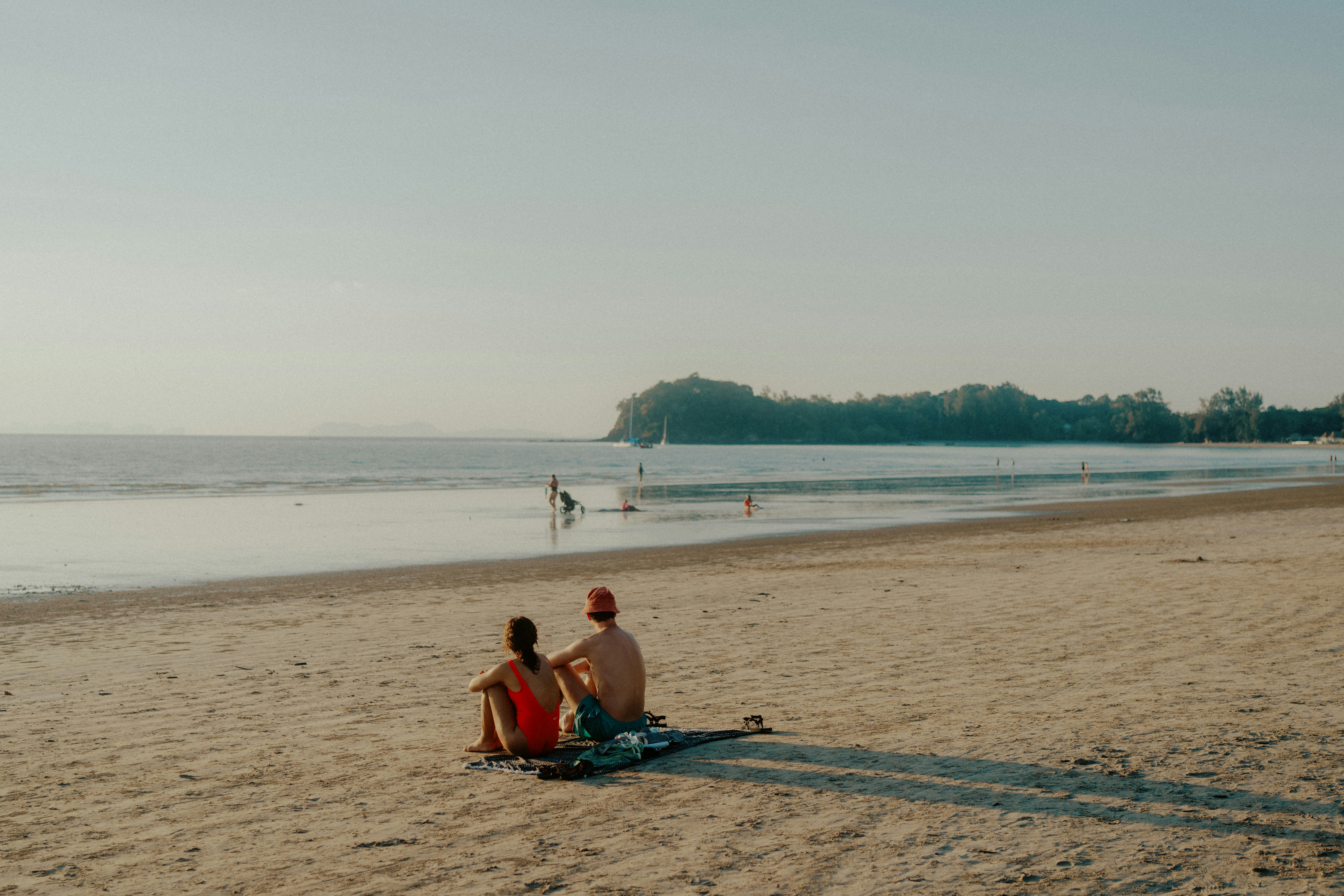 Quiet Beach Conversation at Golden Hour