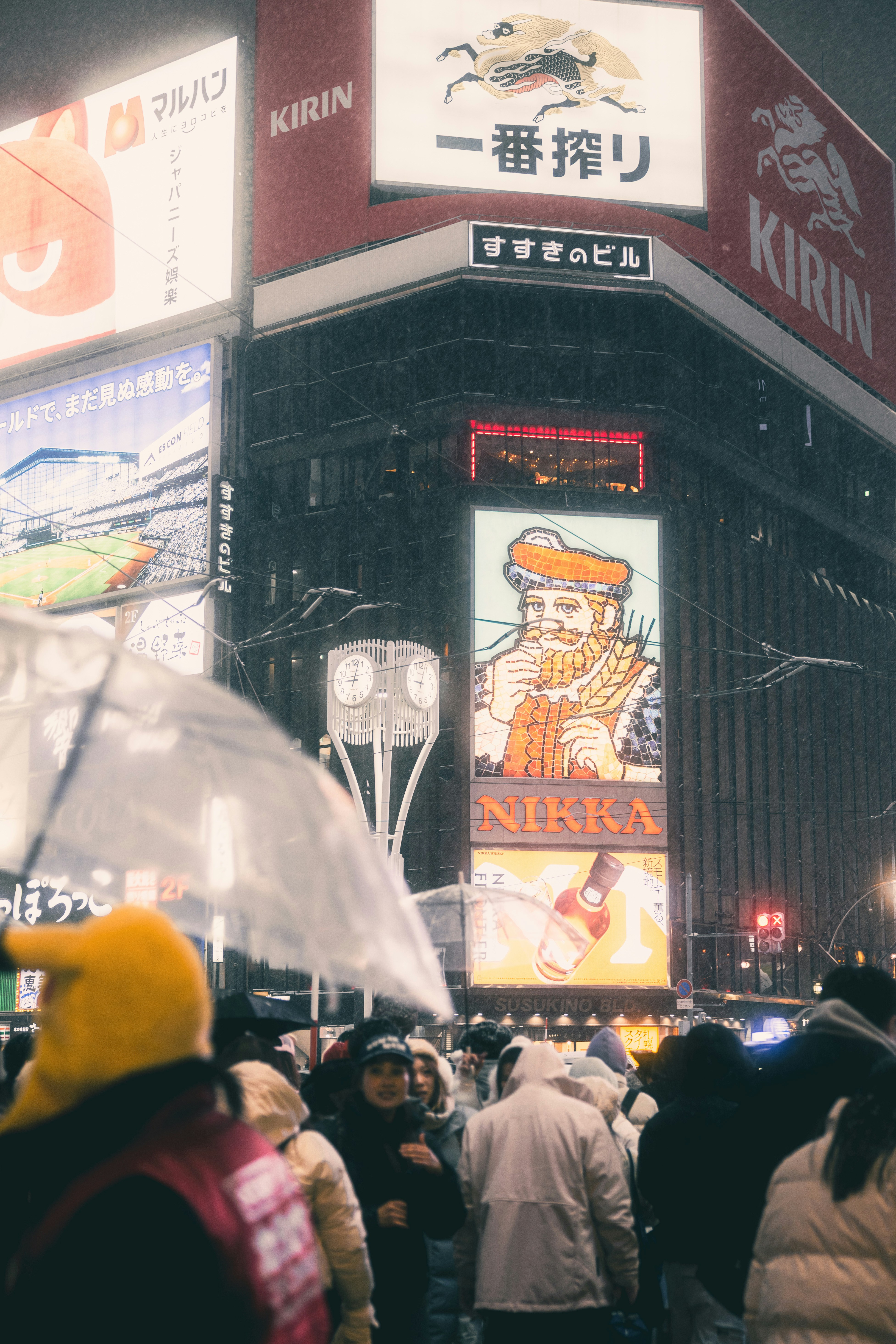 Neon Pulse on a Rainy Crossing: Billboards and Faces in Shibuya Snow