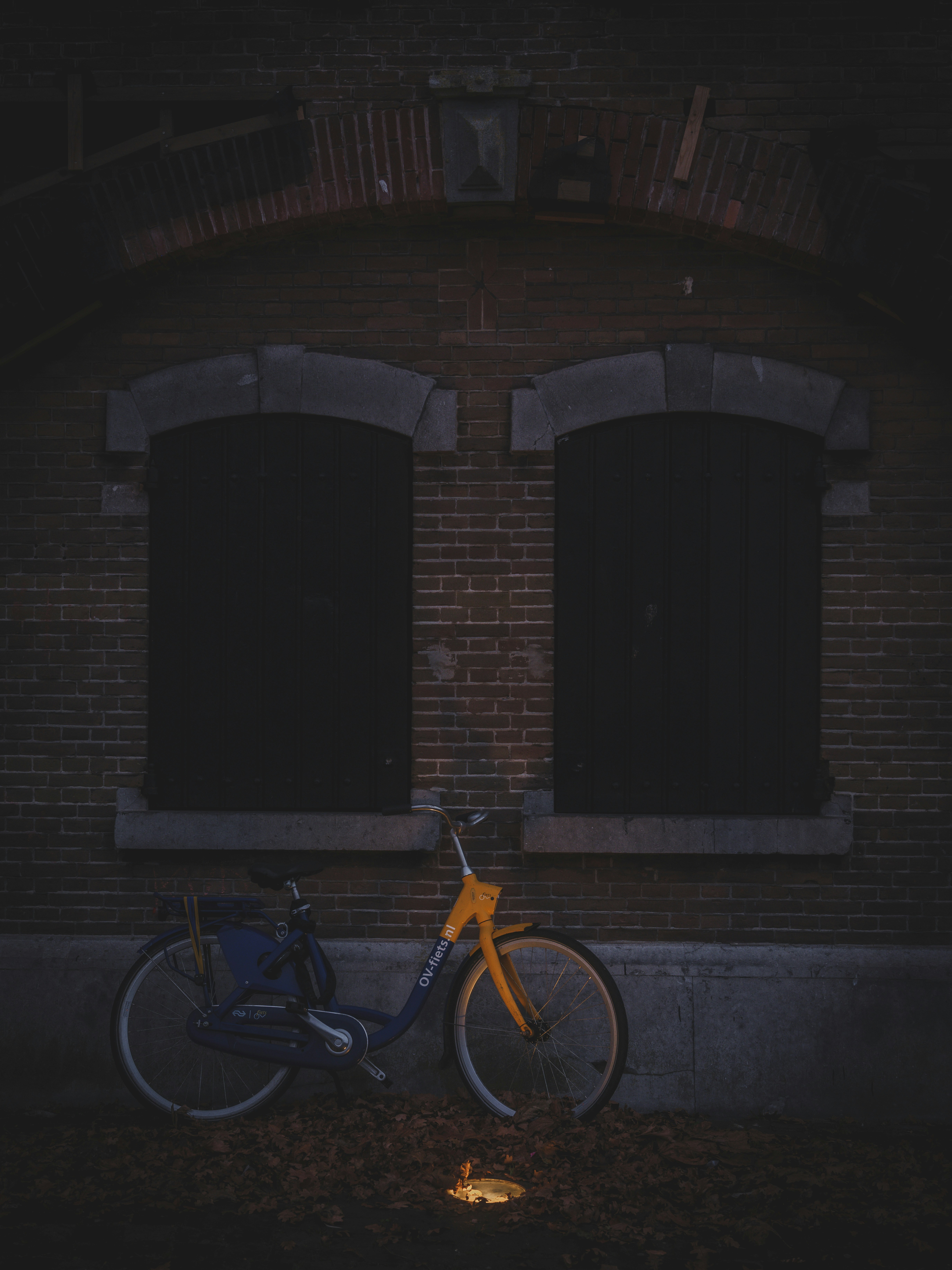 Amber Bike at the Backlit Doorway