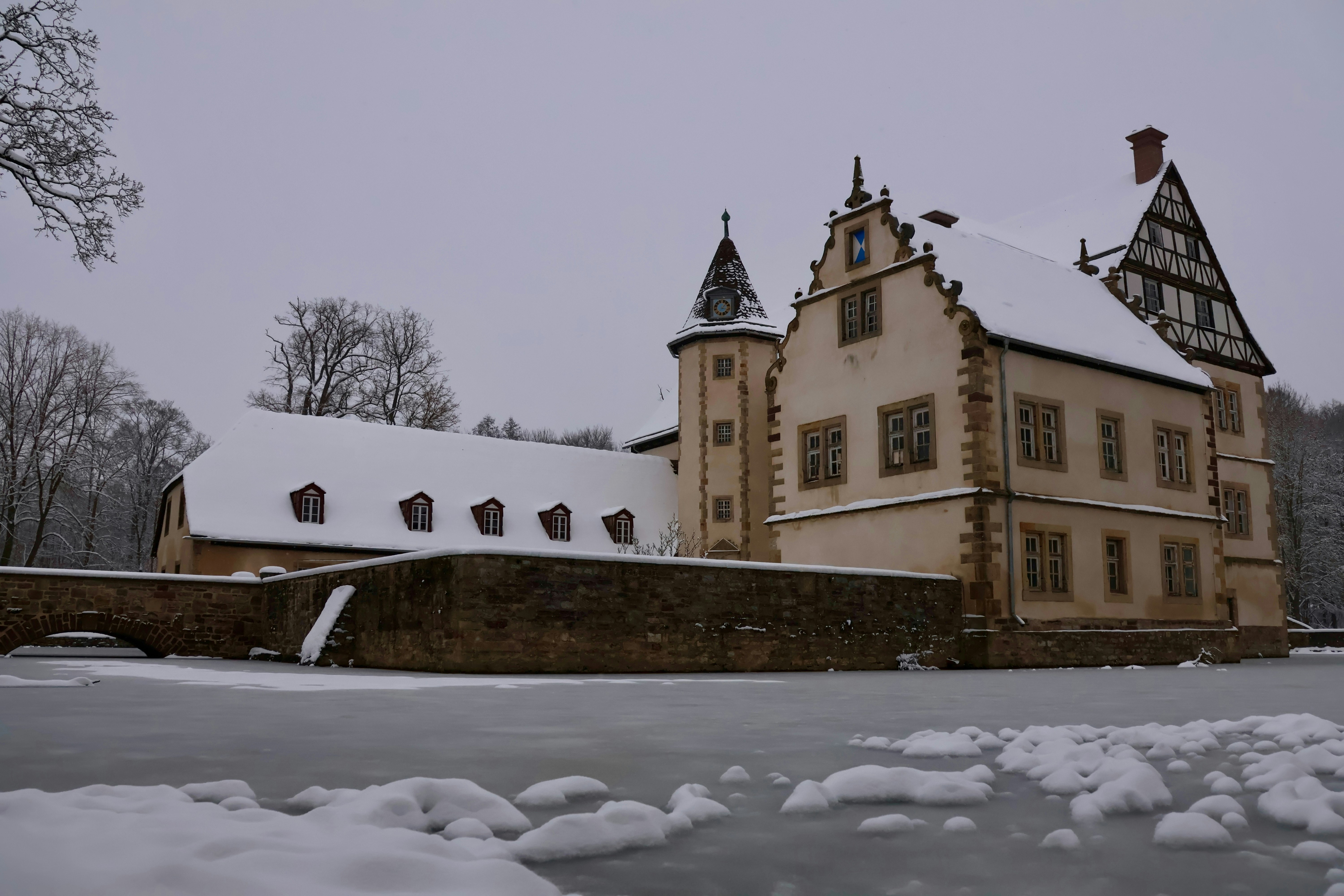 Snowbound Château: A Quiet Winter by the River