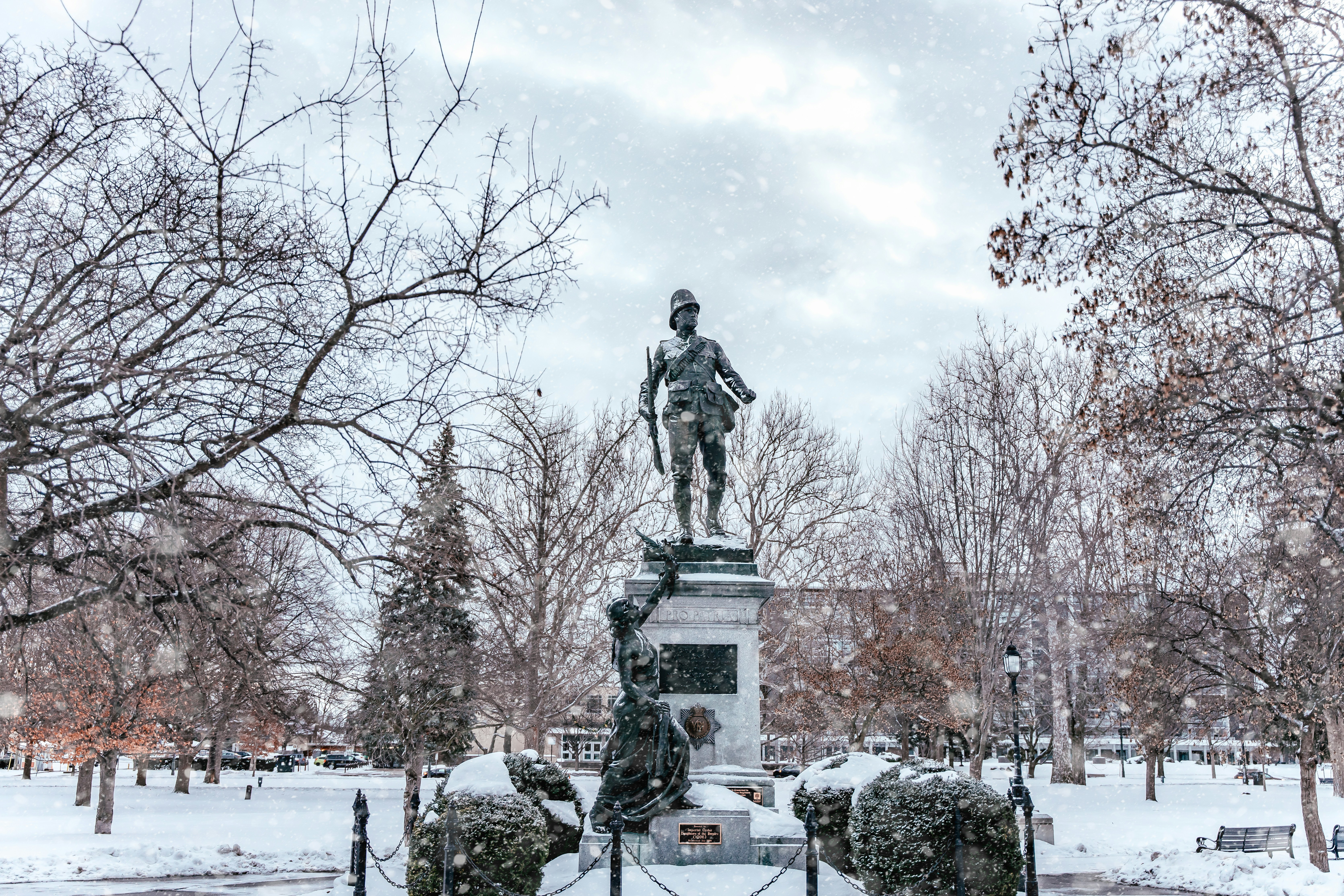 Winter Reverie at the Monument: Snow-Capped Marble in a Quiet Park