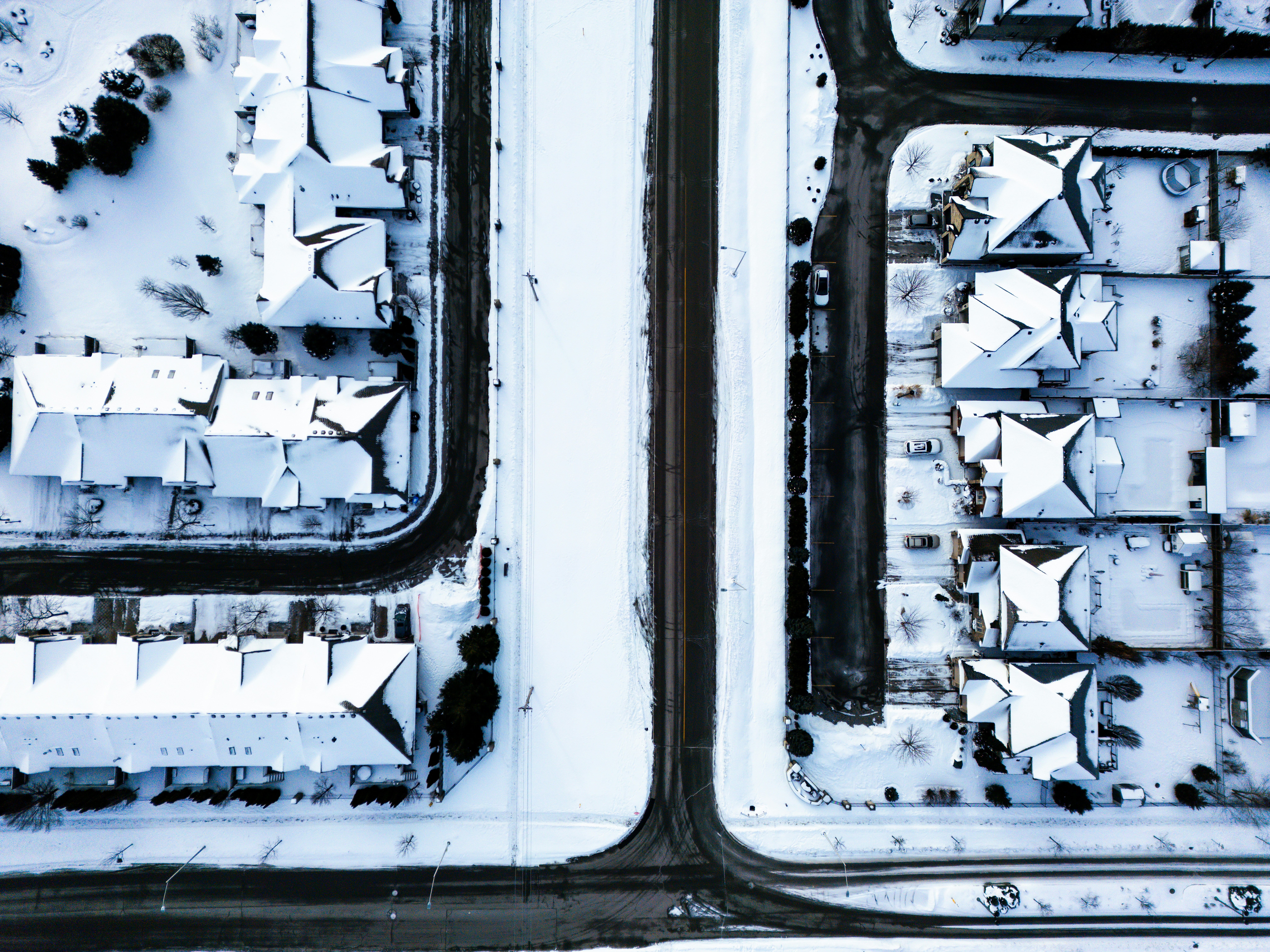 Snowbound Grid: Aerial Quiet Over a Quiet Suburban Junction