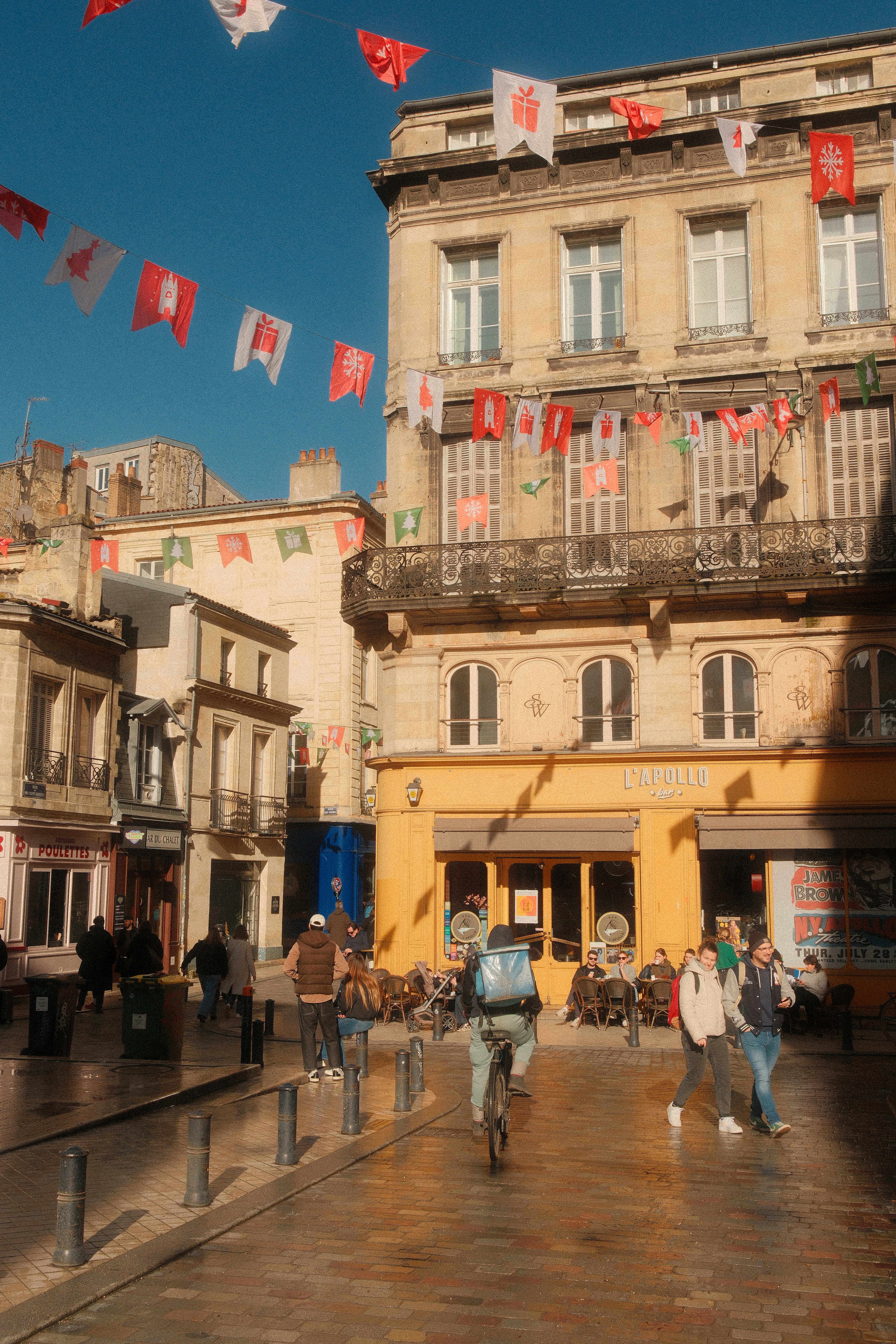 Sunlit Arcades: Busy Pedestrian Street in Warm Cine-Color