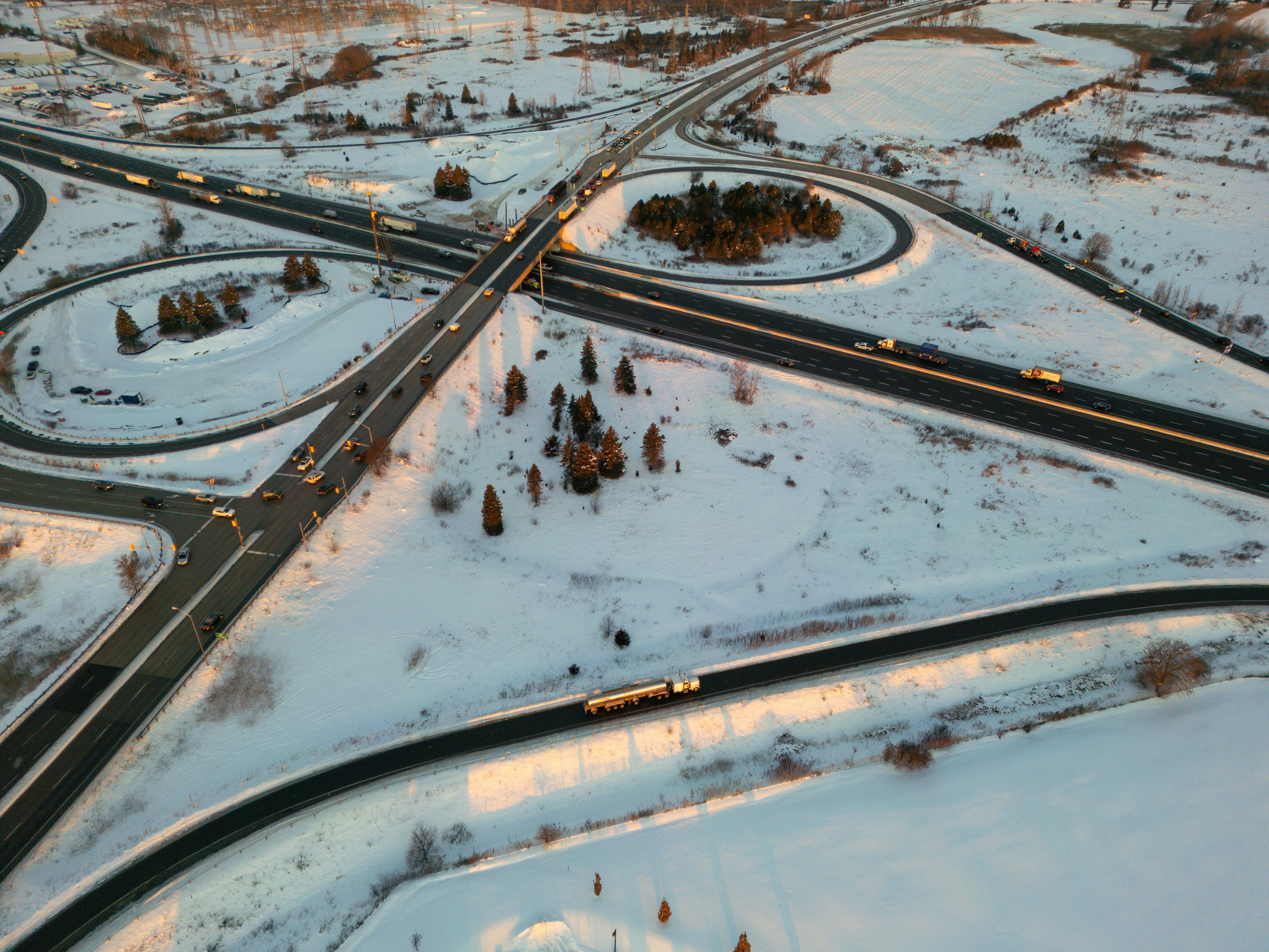 Snowbound Interchange: Aerial Roads Weaving Through Winter Silence