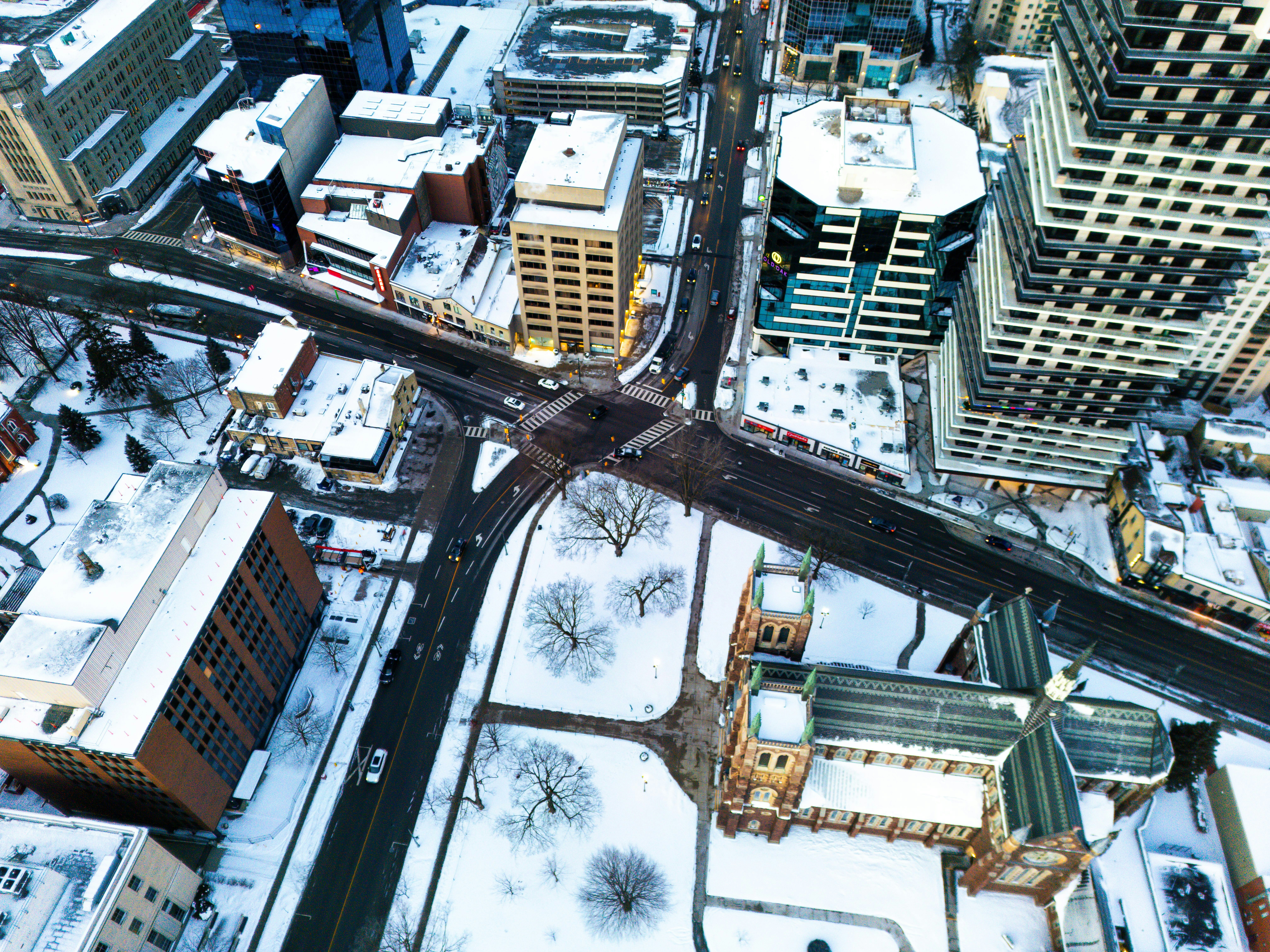 Snow-Capped Grid: Aerial Confluence Beneath Winter Silence