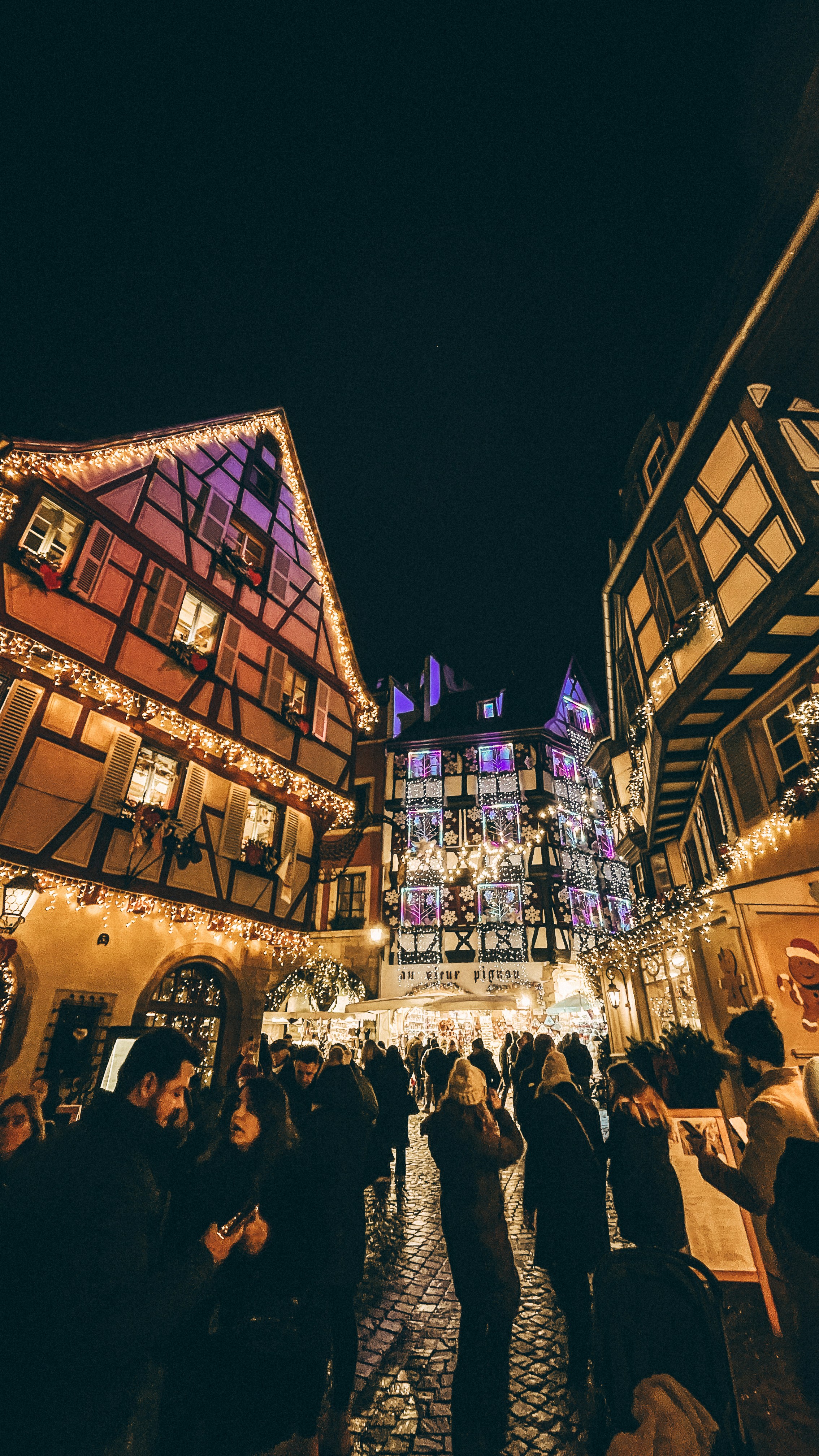 Lanterns Over Cobblestones: A Festive Street in Twilight