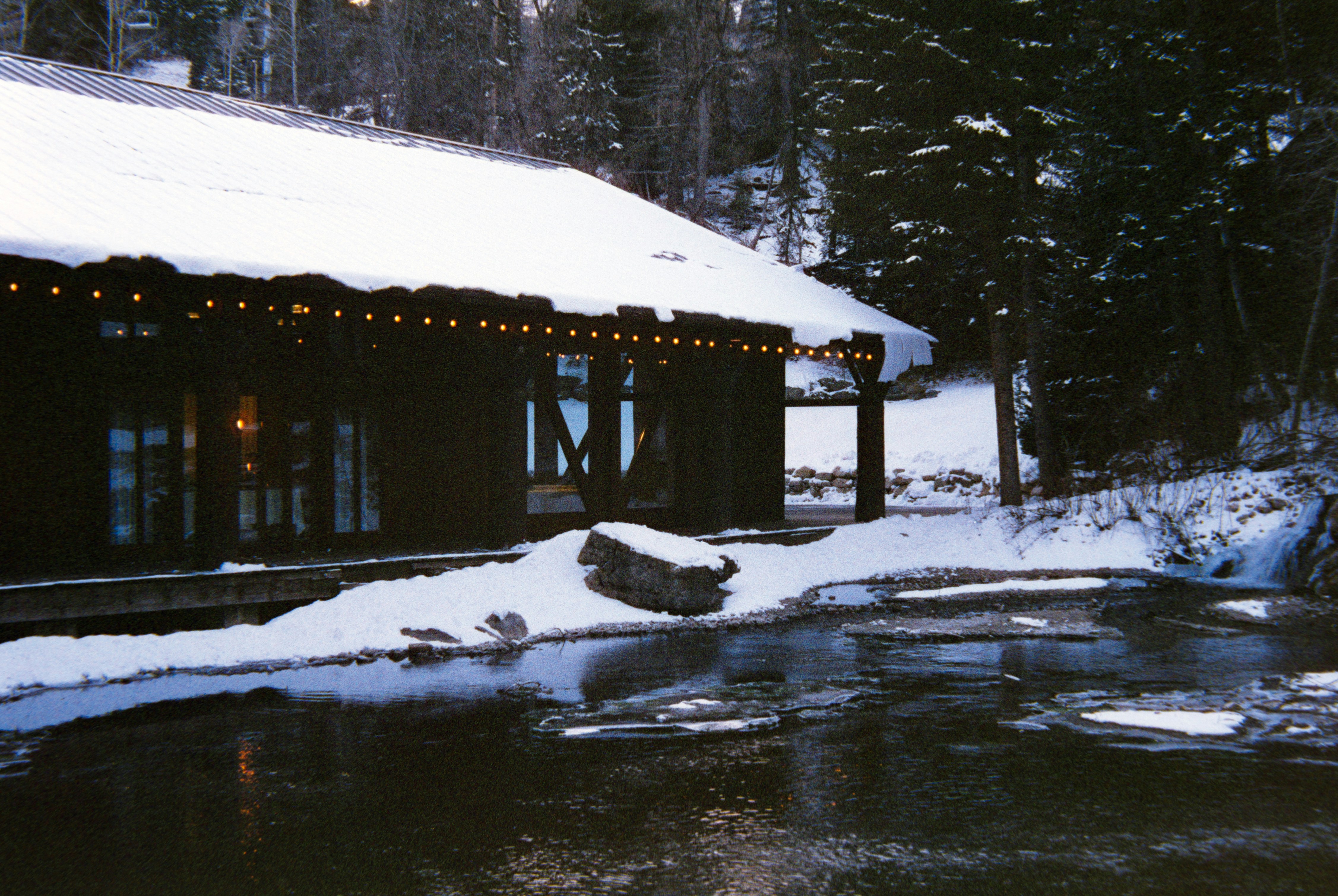 Snow-Quiet Lodge by the Cold River