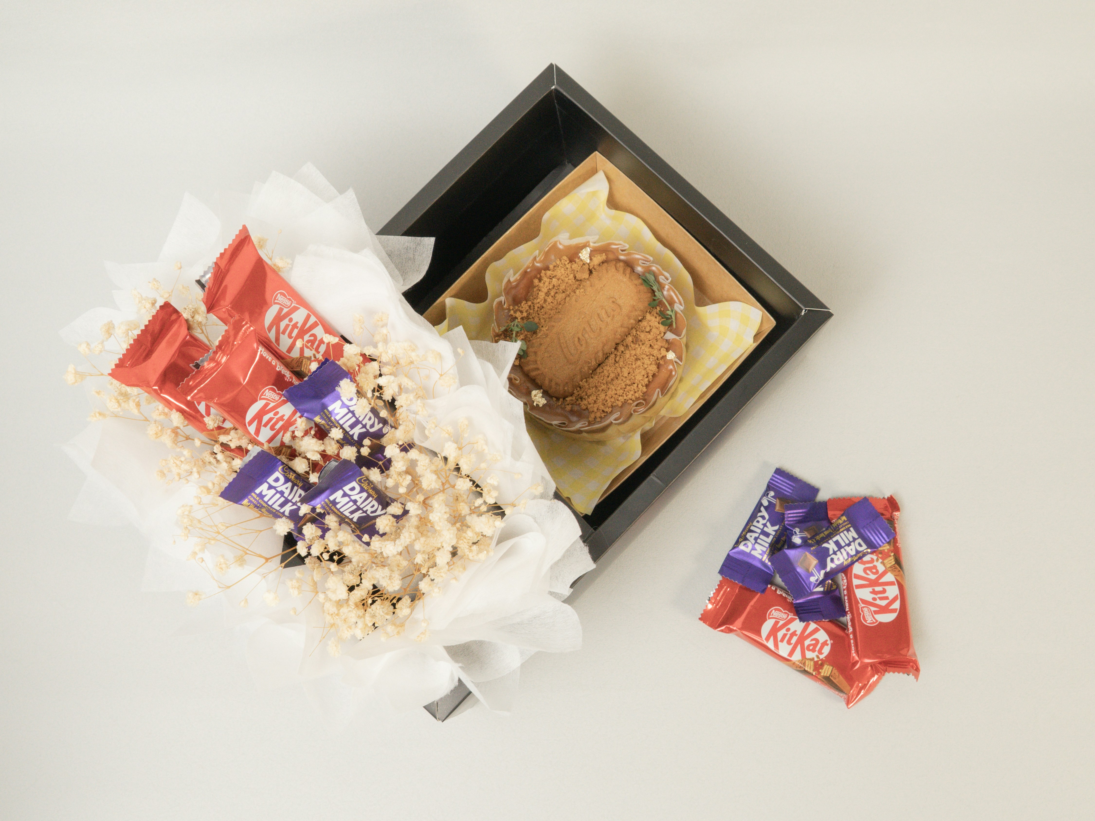 Sweet Confections in Contrast: KitKat Bouquet and Boxed Treat