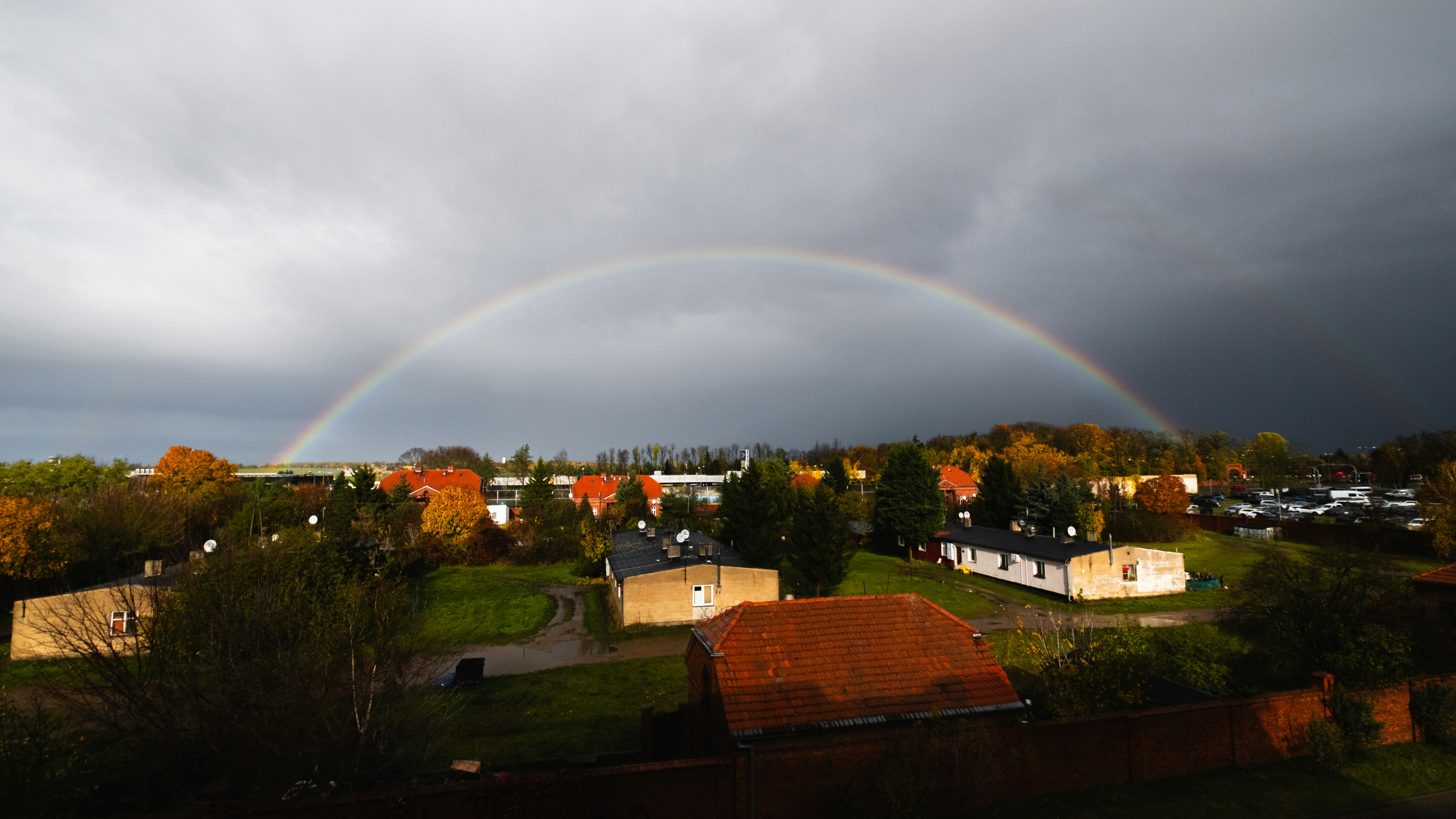Arc of Hope Over a Quiet Suburban Horizon
