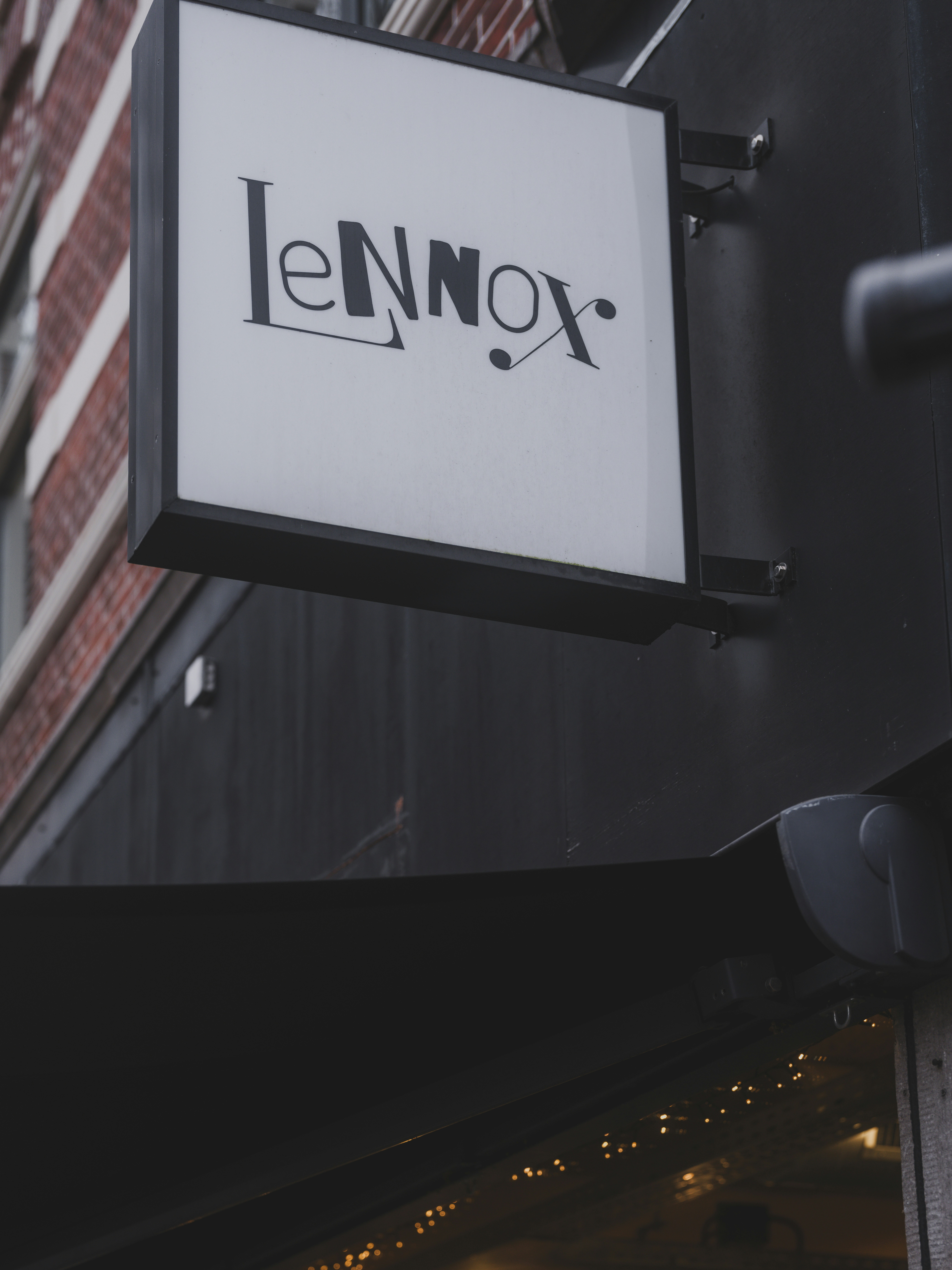 Lennox Sign in Warm Urban Glow
