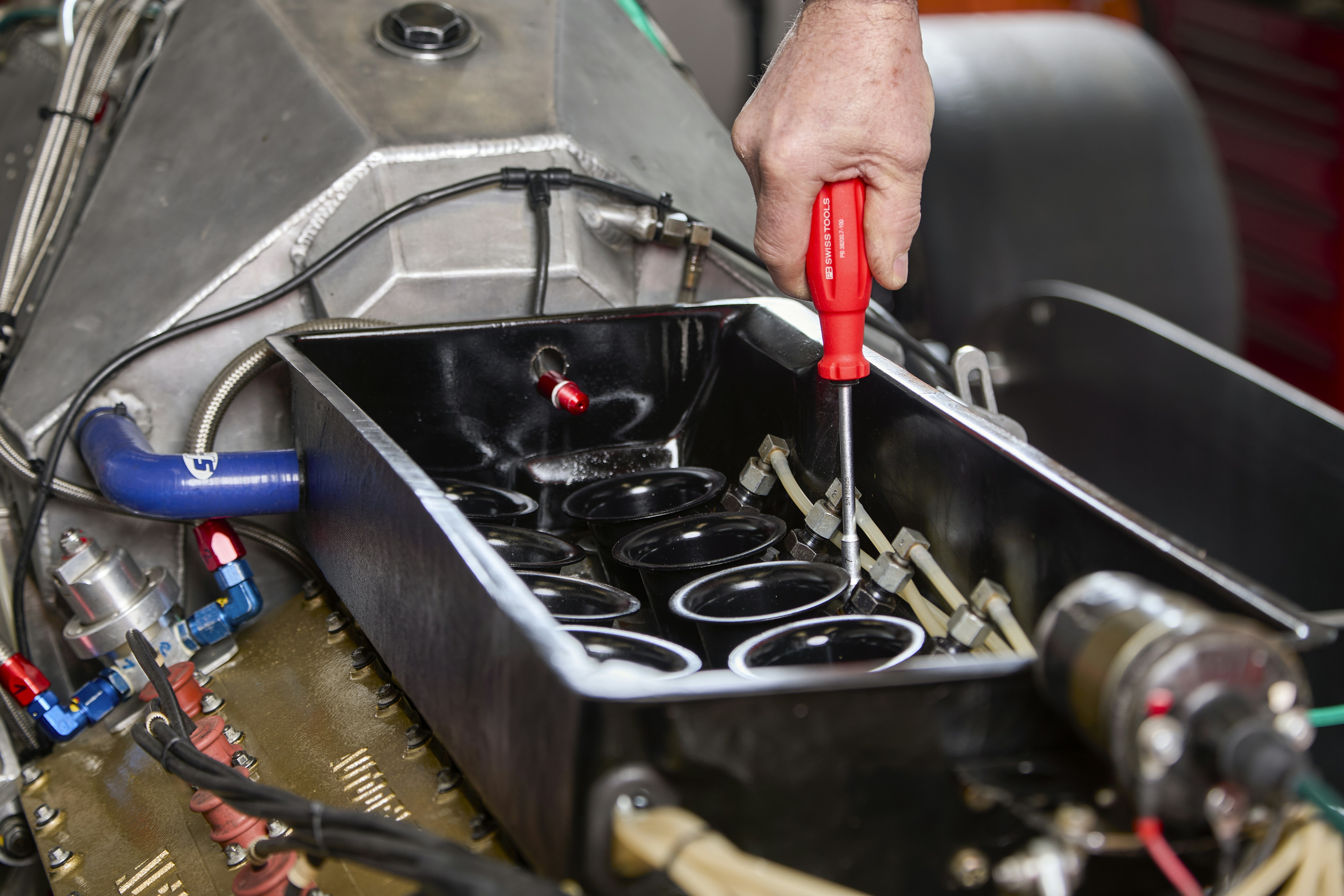 Dialing In the Heart of the Engine: The Hand, Tools, and Cylinders in Focus
