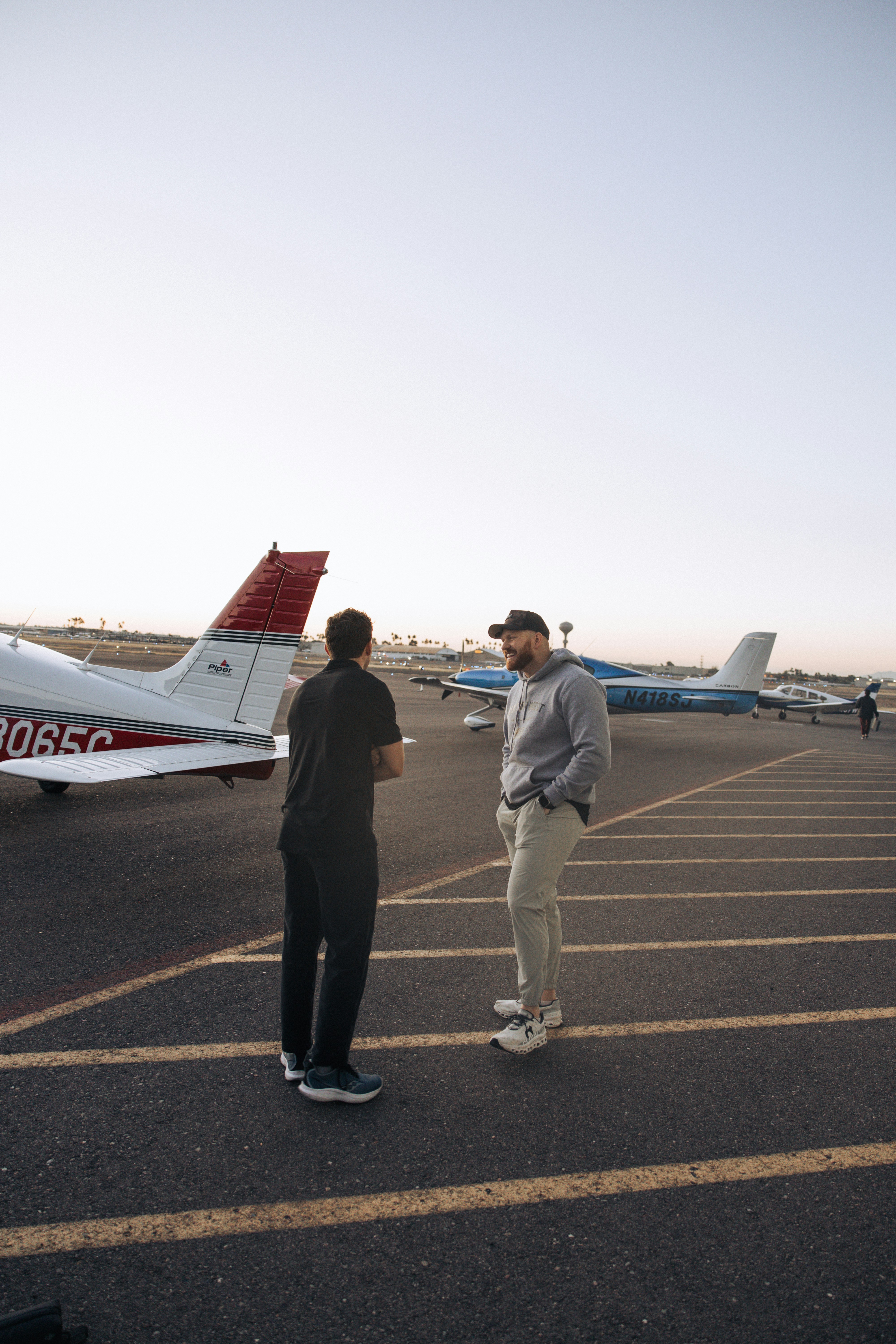 Conversation at the Quiet Tie-Down: Two Pilots in the Tarmac Light