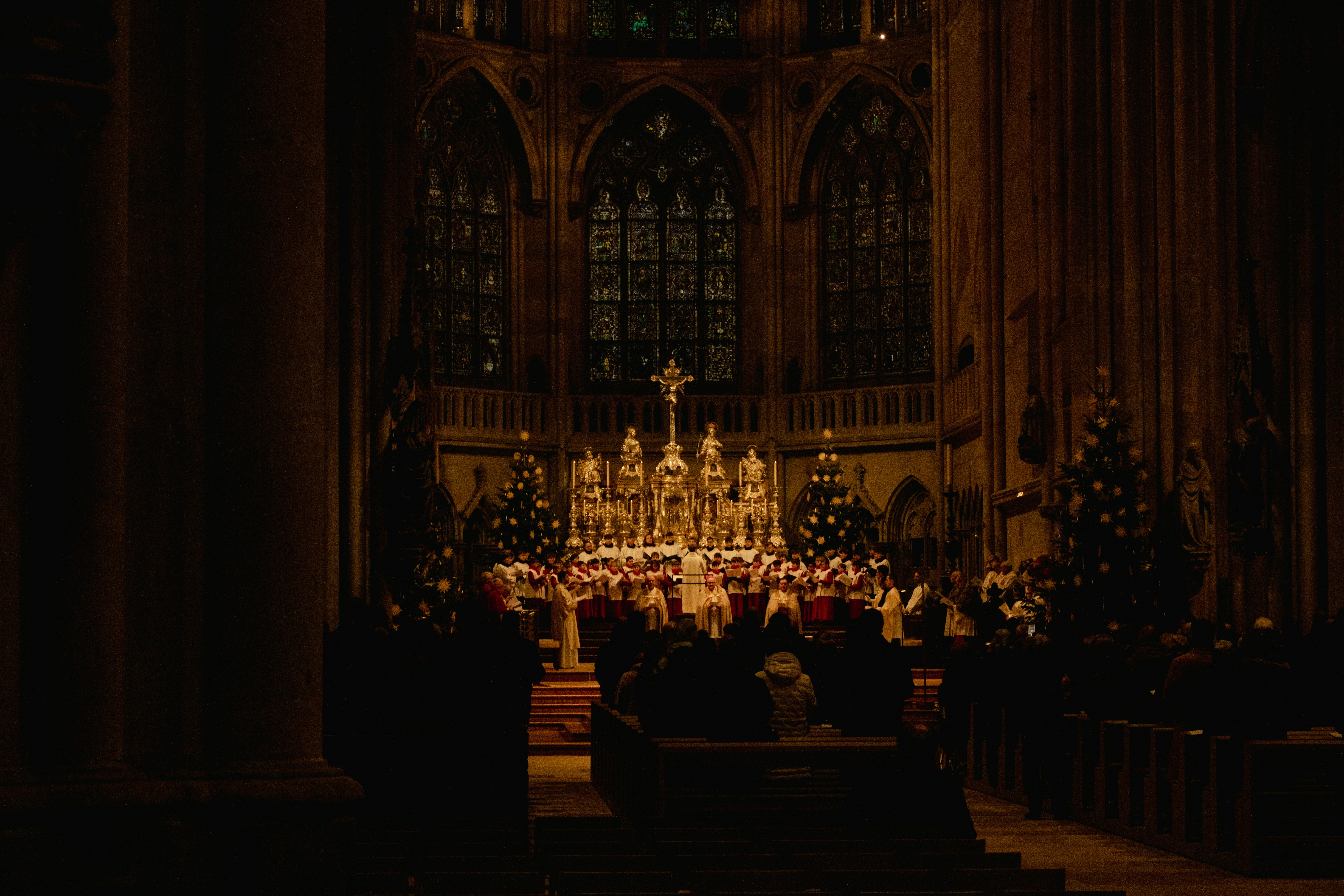 Evening Choir in the Cathedral: Warm Light Illuminates the Altar