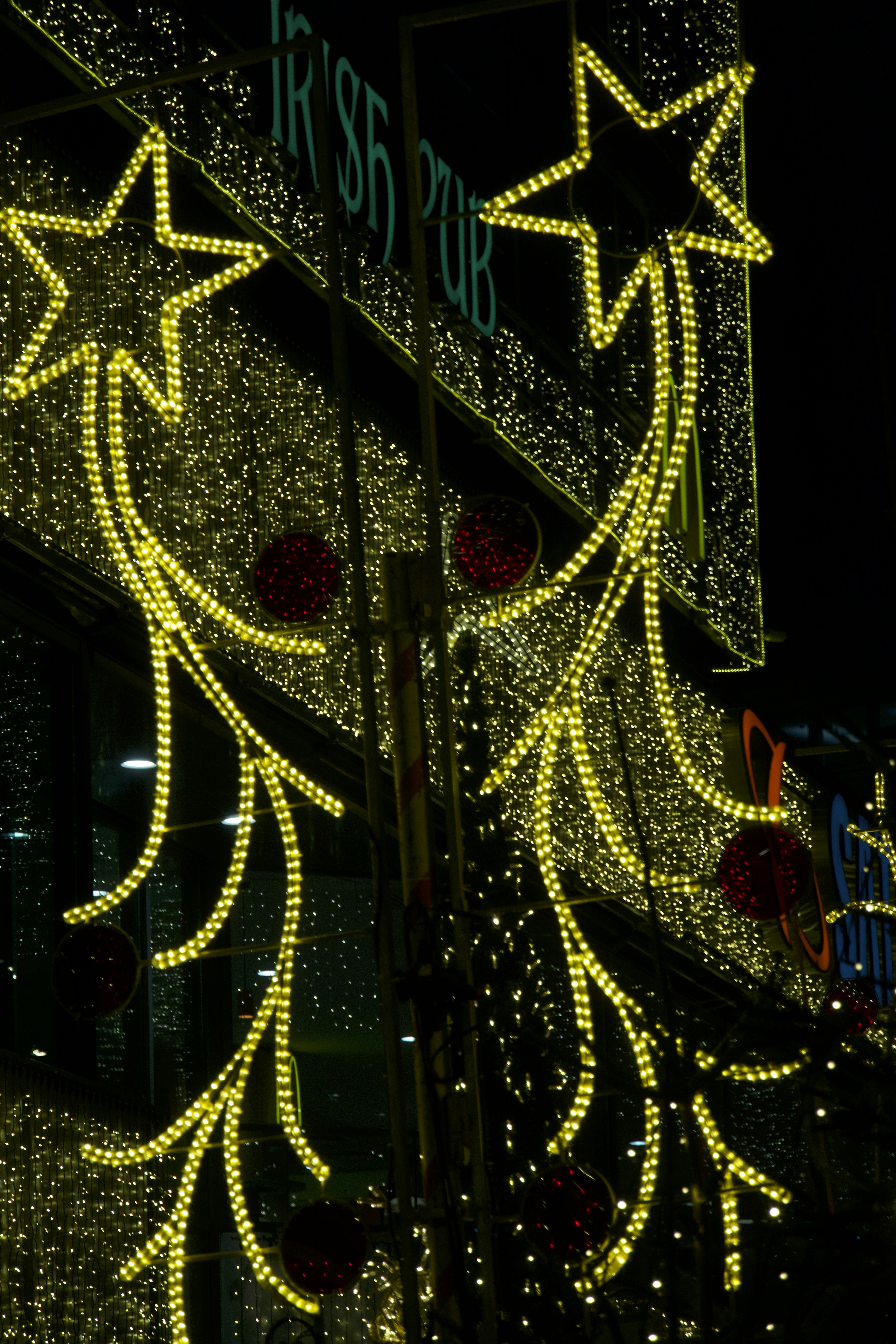Glowing Holiday Ornaments Reflected in Nightglass
