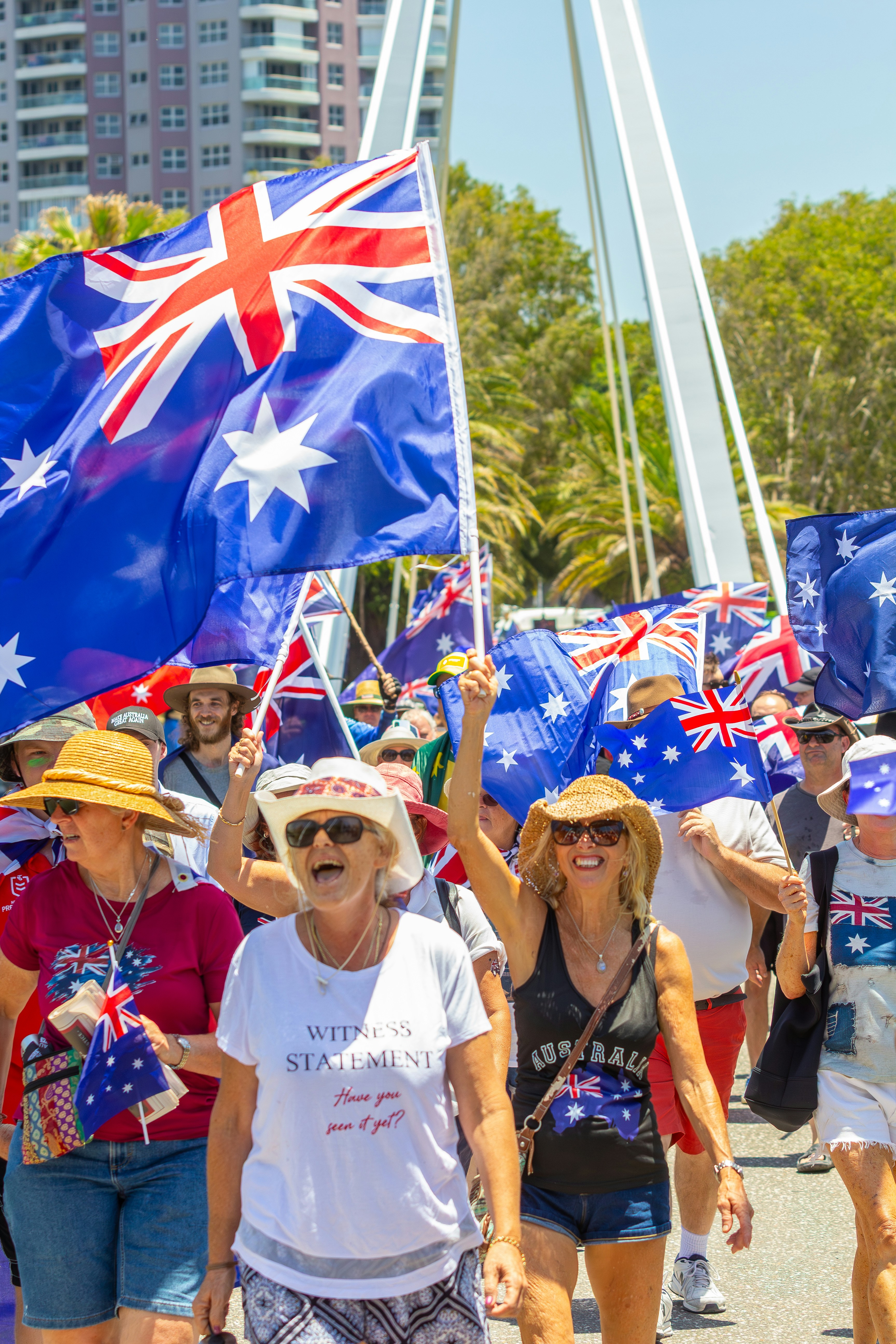 Crowd of people waving australian flags during a parade. photo – Free ...