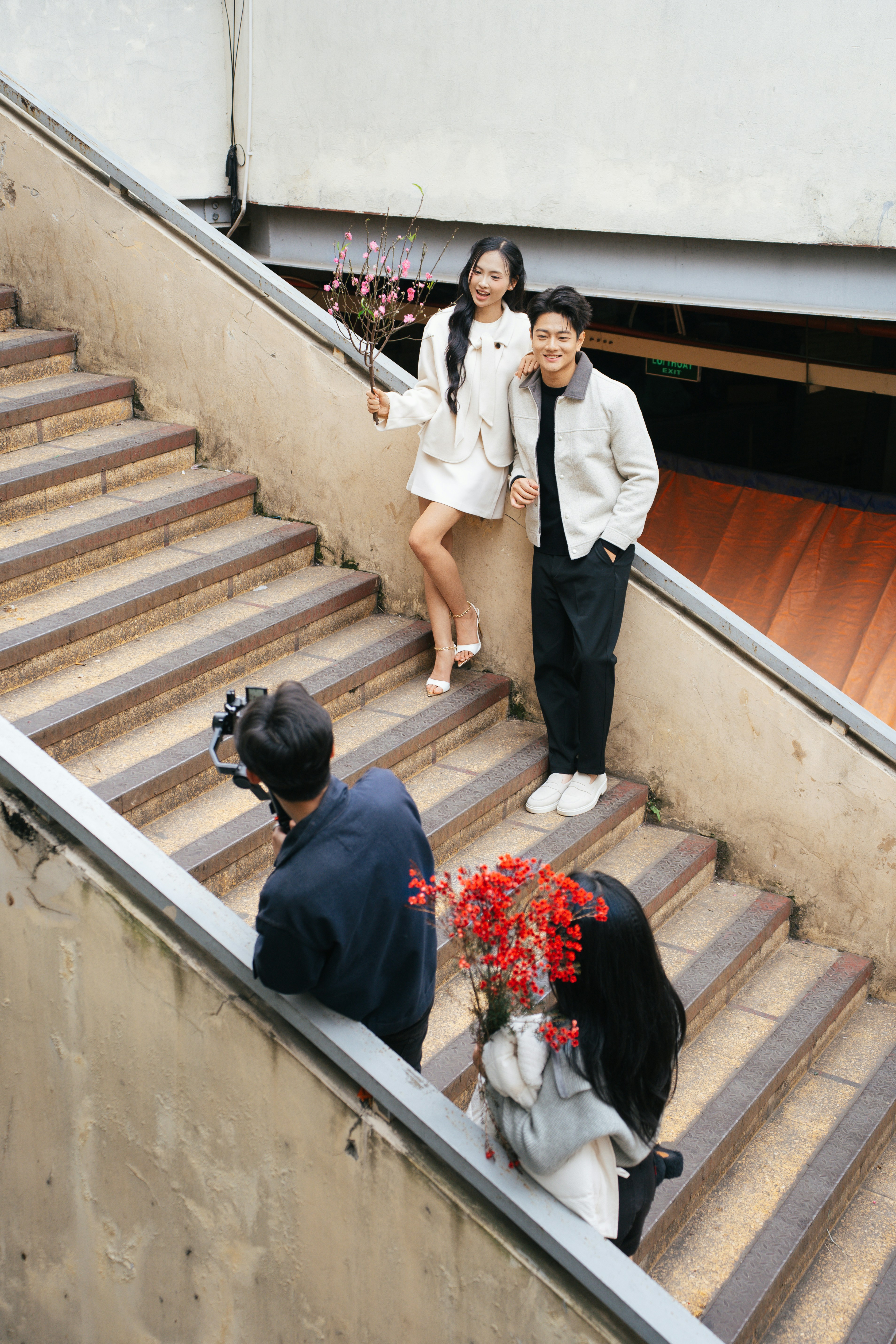 Staircase Portrait: A Moment Between Couples