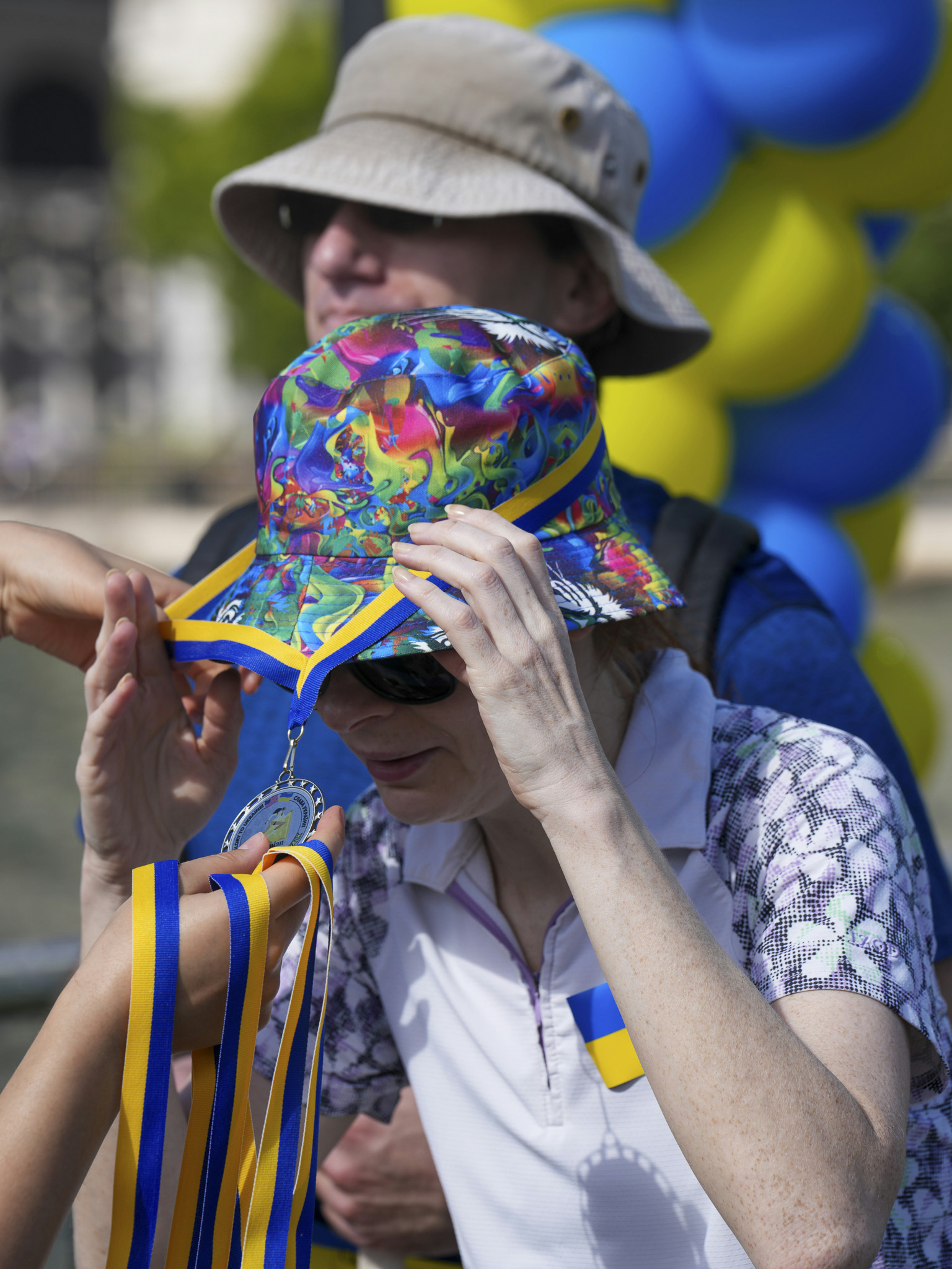 Colorful hat ceremony: a masked moment of celebration