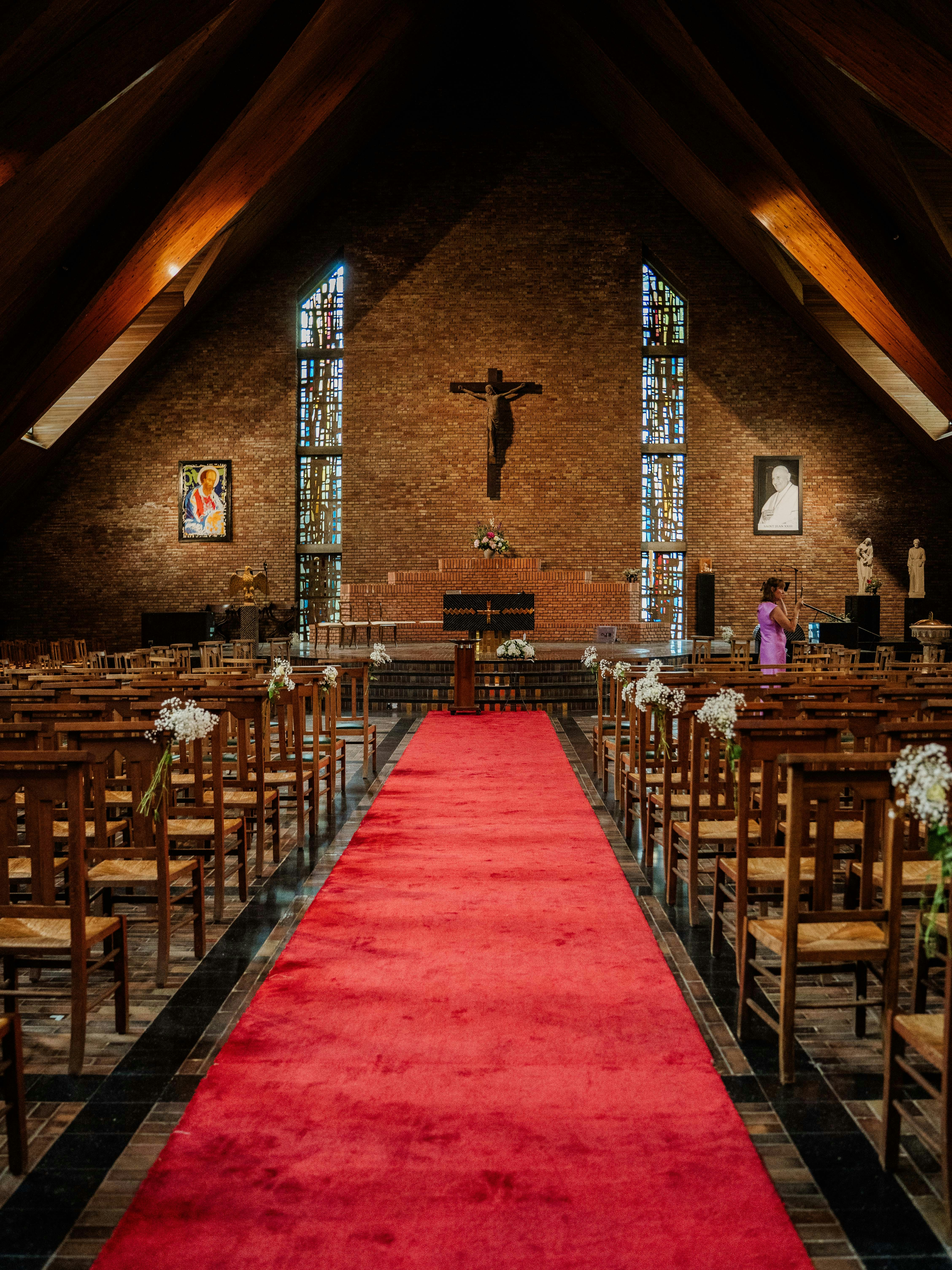 Crimson Aisle: A Quiet Ceremony in a Brick-Church Hall