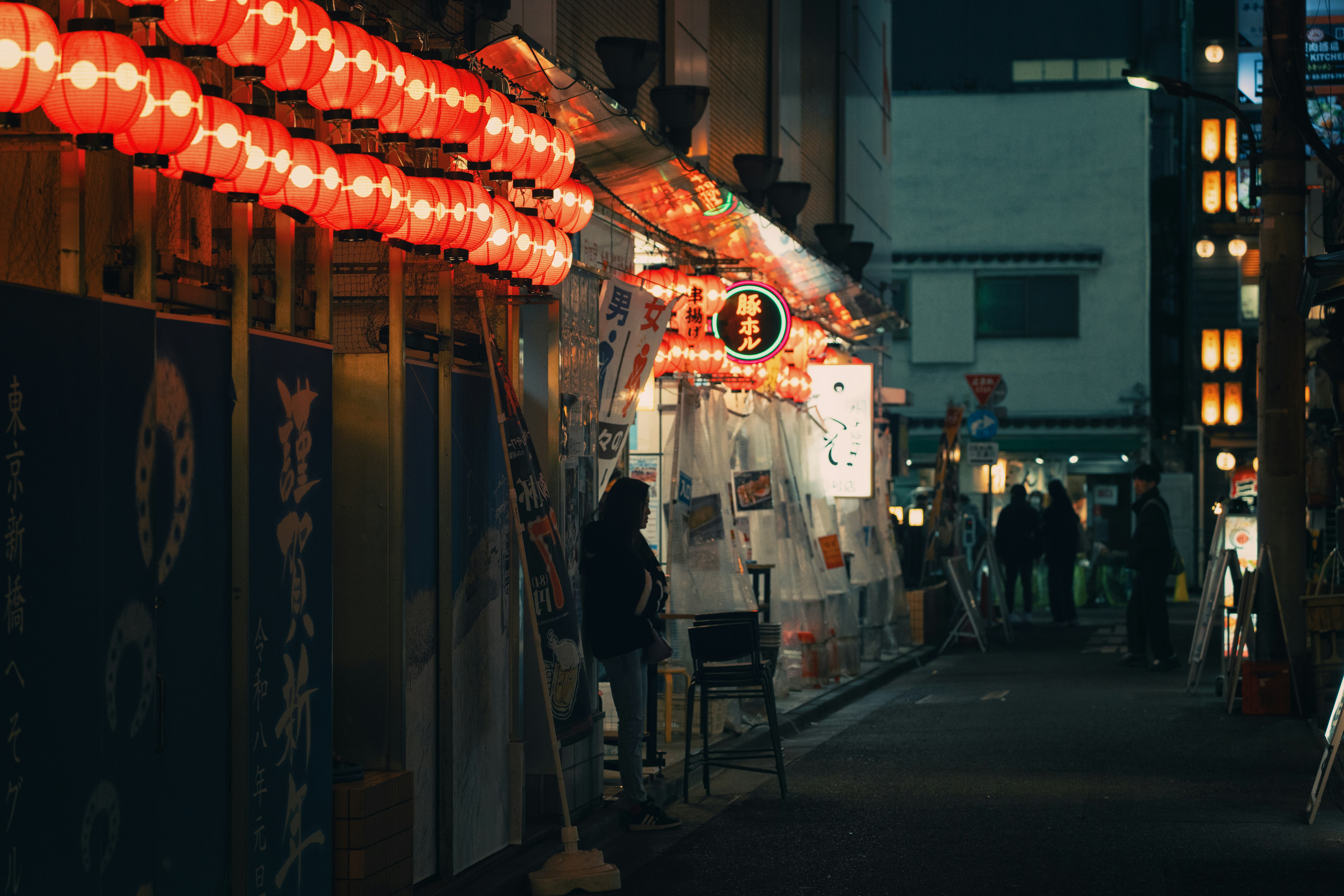 Lanterns in the Night Market: Neon Path Through a Japanese Street