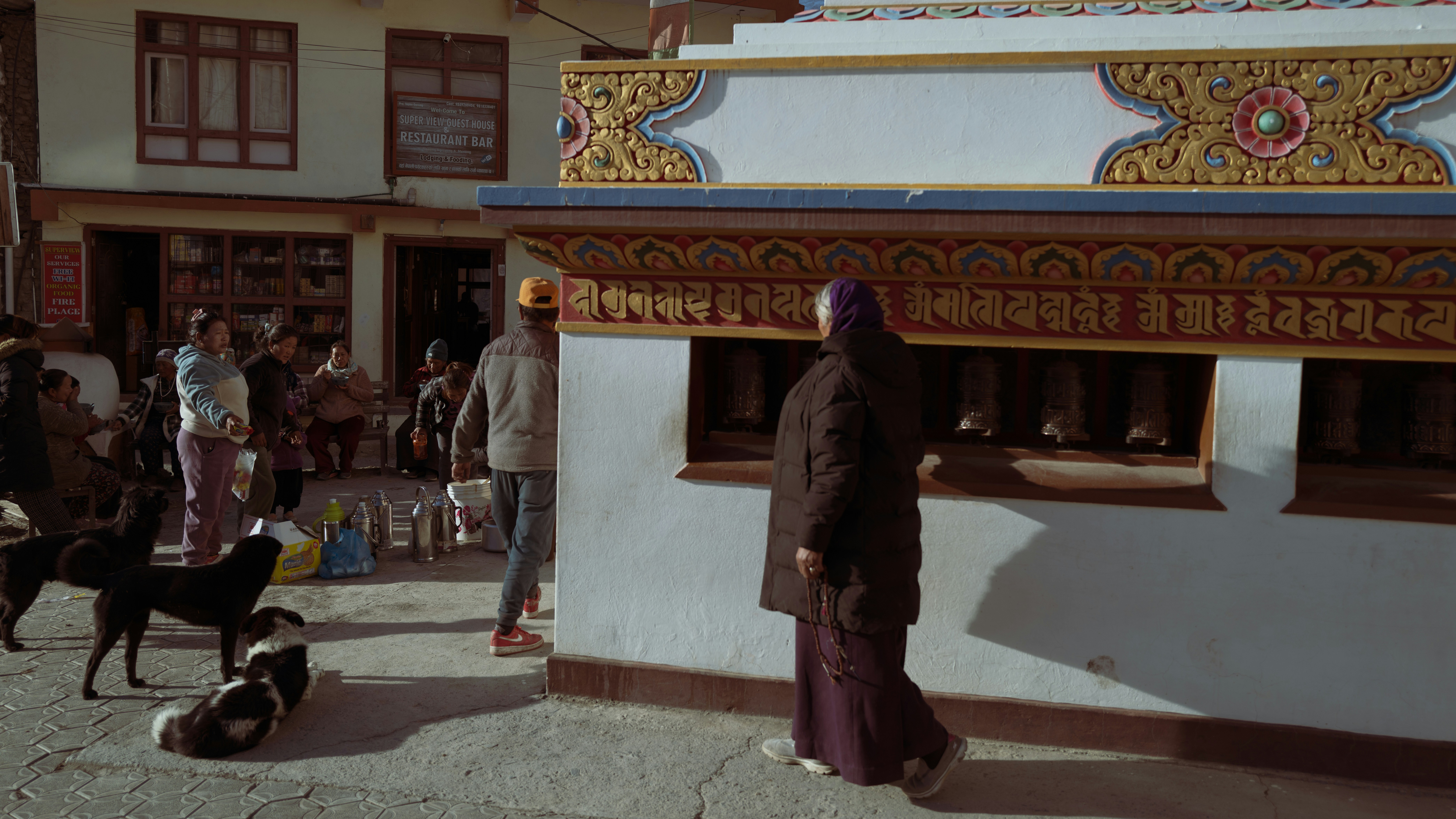 Prayer Courtyard in Sunlit Street Market