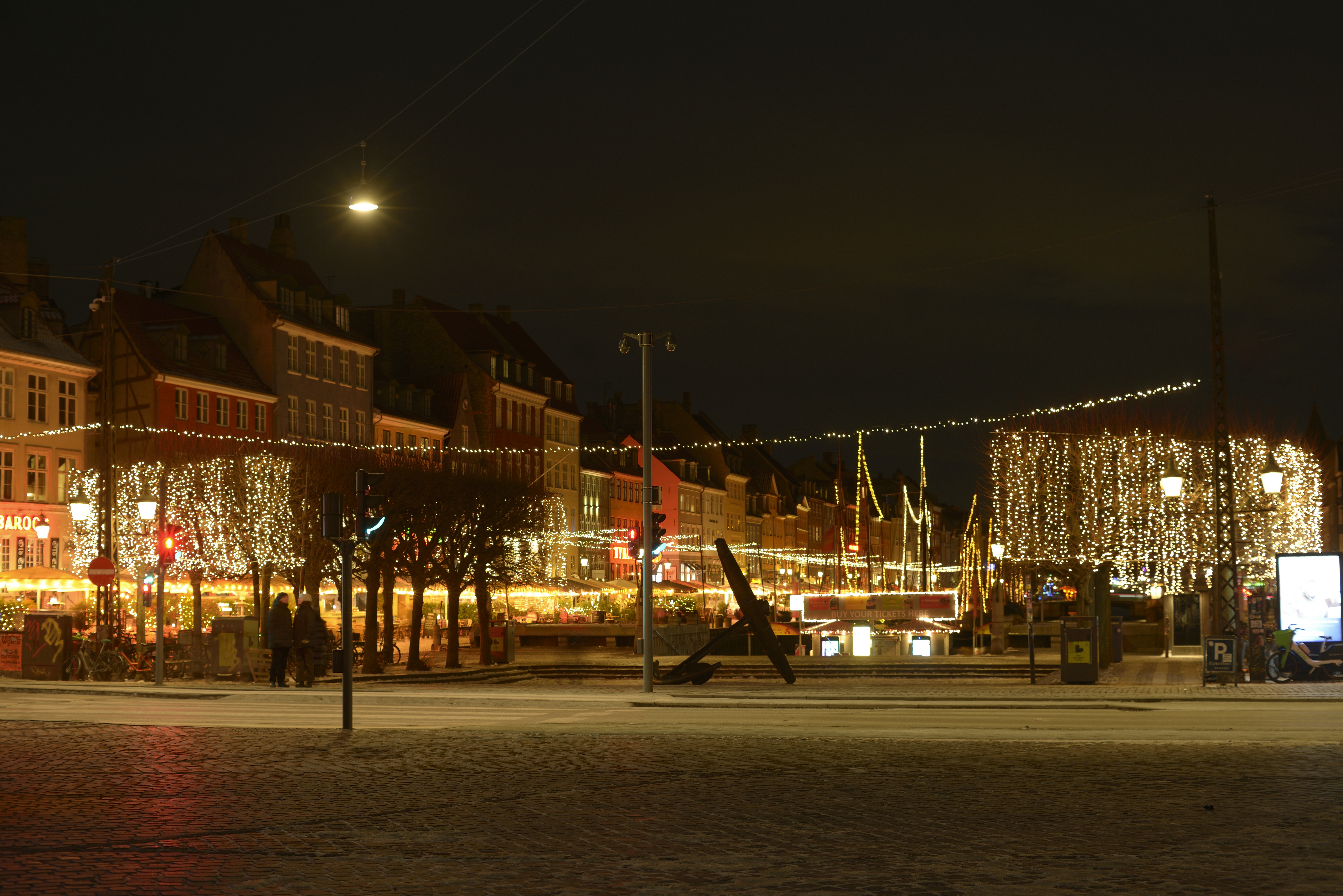 Night Market Lights Over a Snowy Square