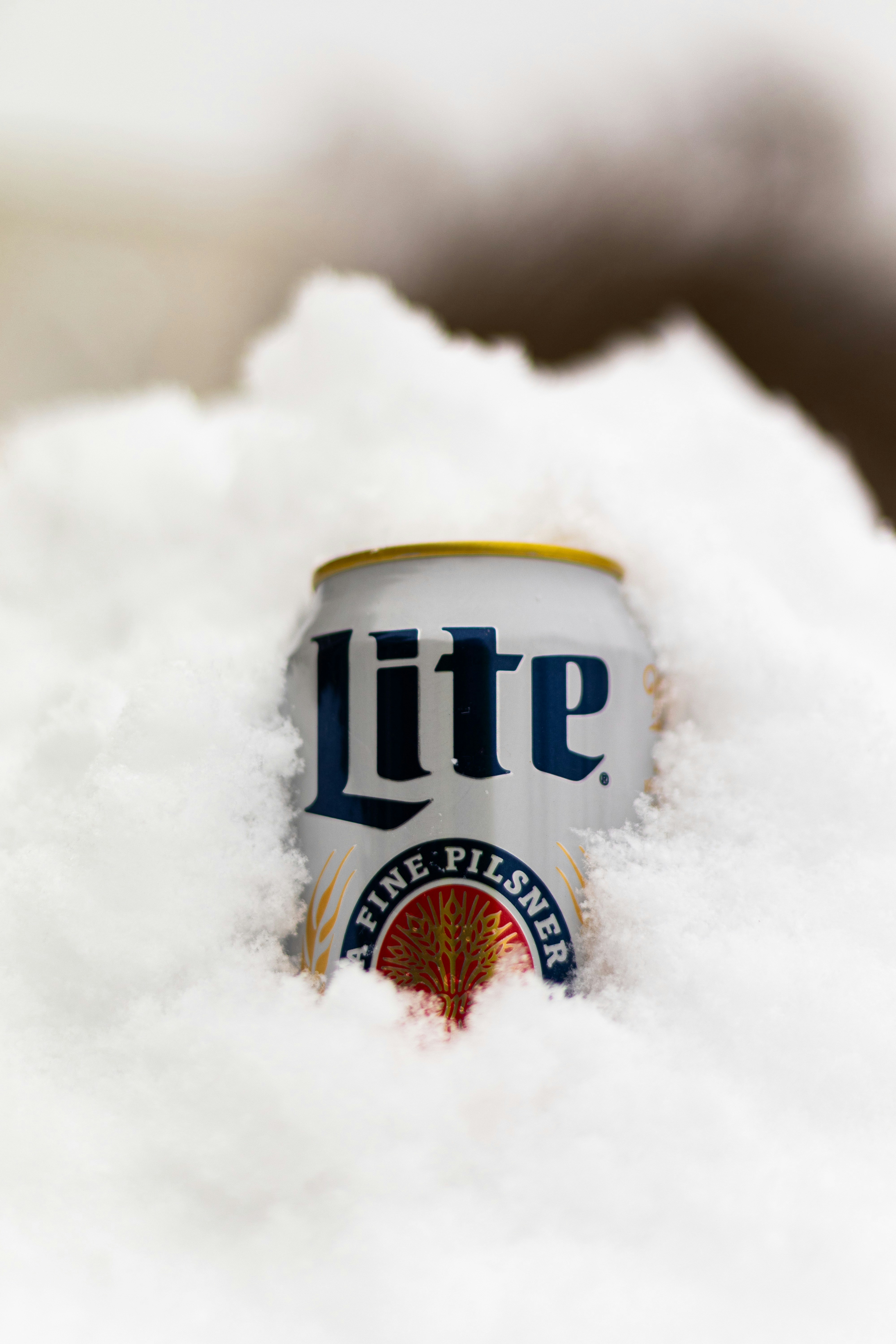 Snow-Cooled Brew: Miller Lite Bead Nest in White Drift