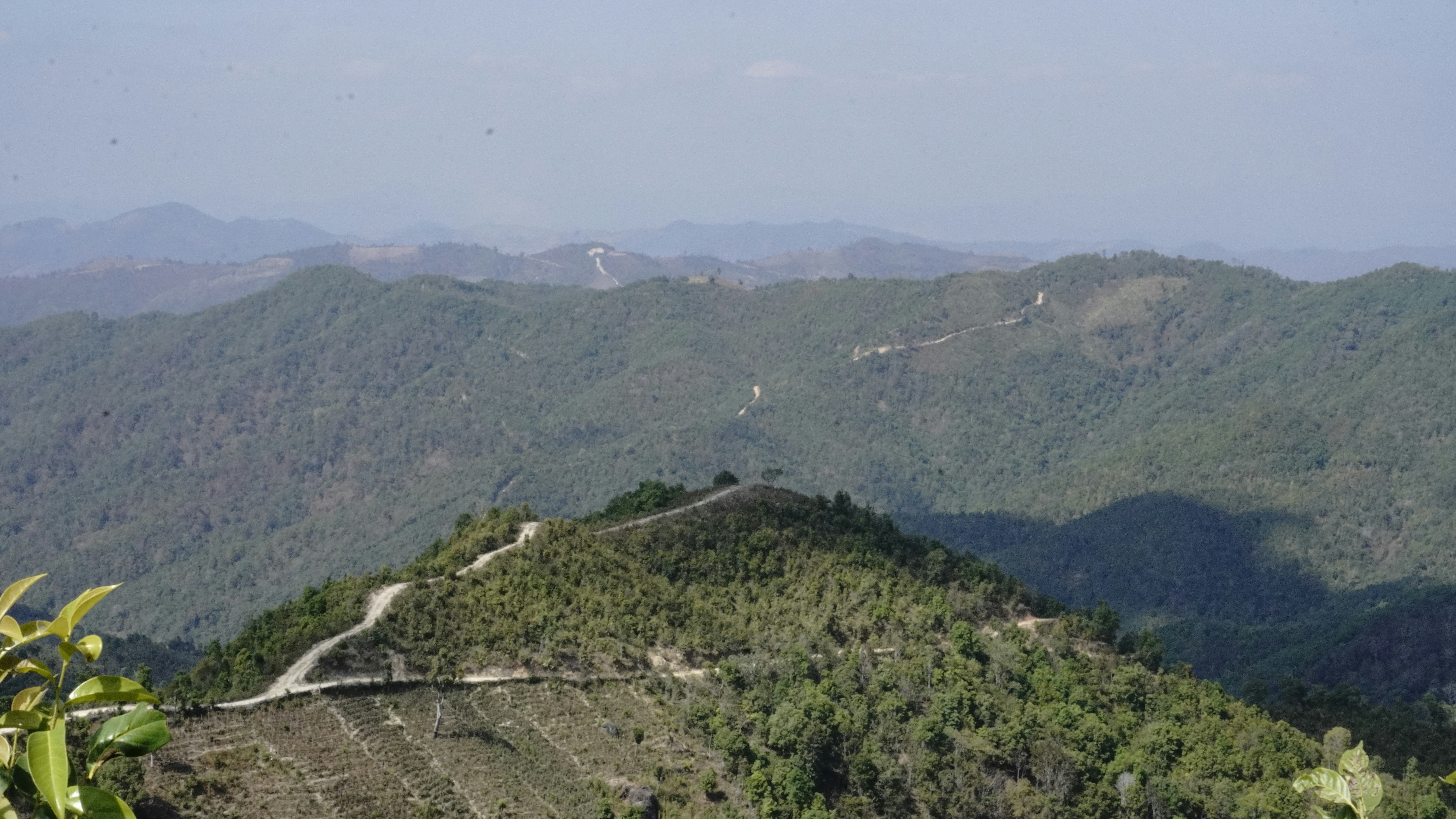 Ridge Road Traces: A Quiet Panorama Across Layered Hills