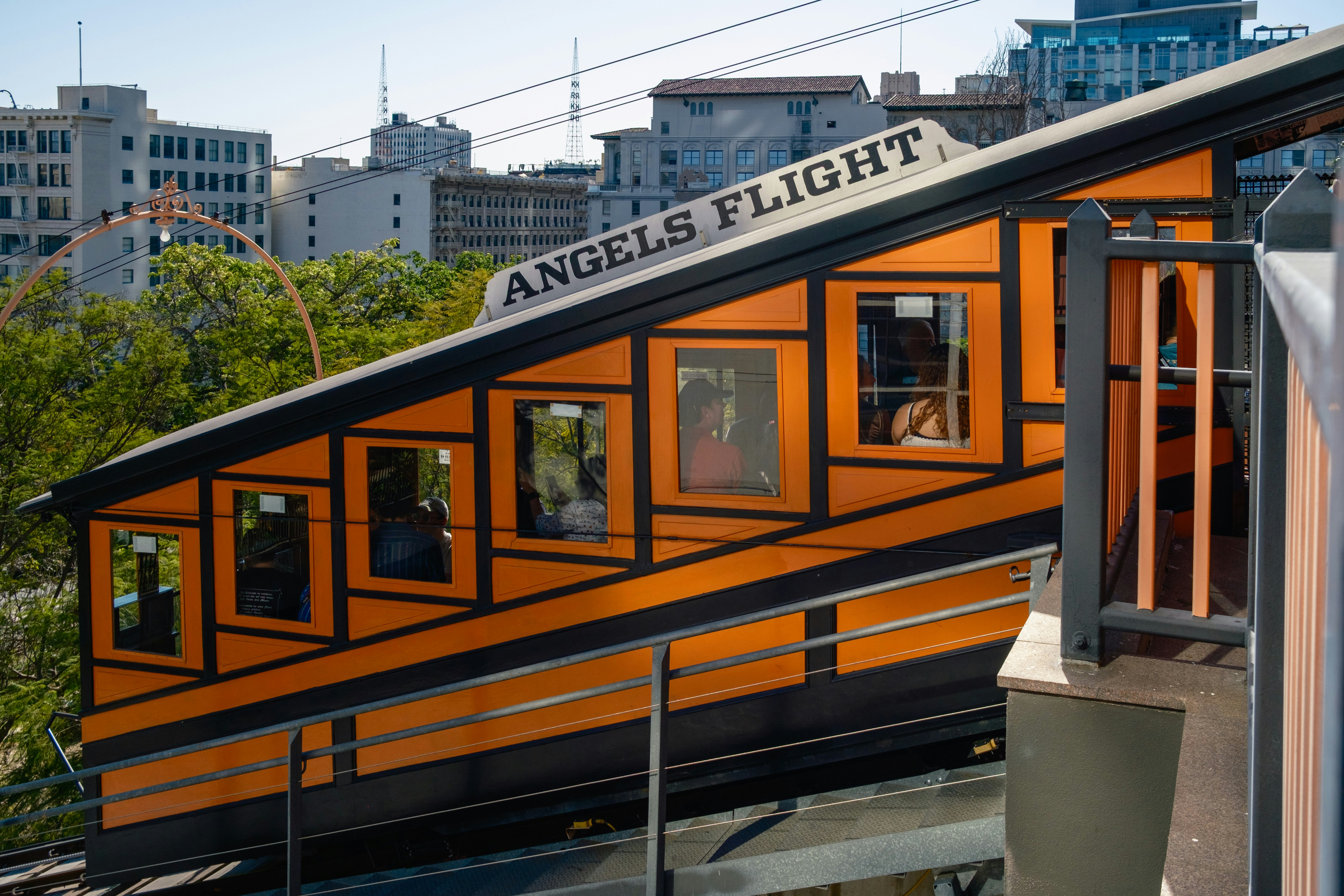 Angels Flight: A shared ride through a painted window of orange carriages