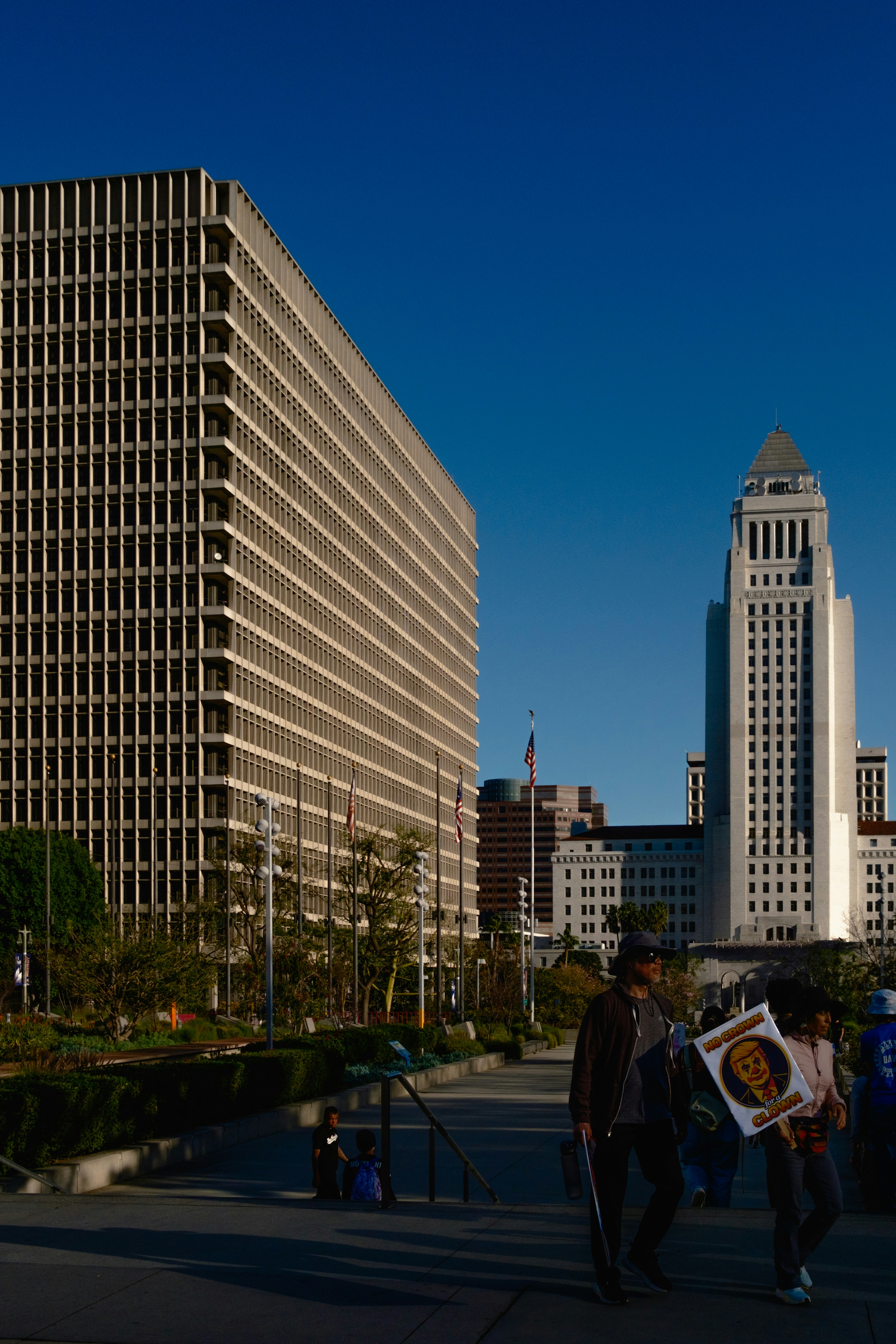 Urban Portrait Beneath a Towering Skyline