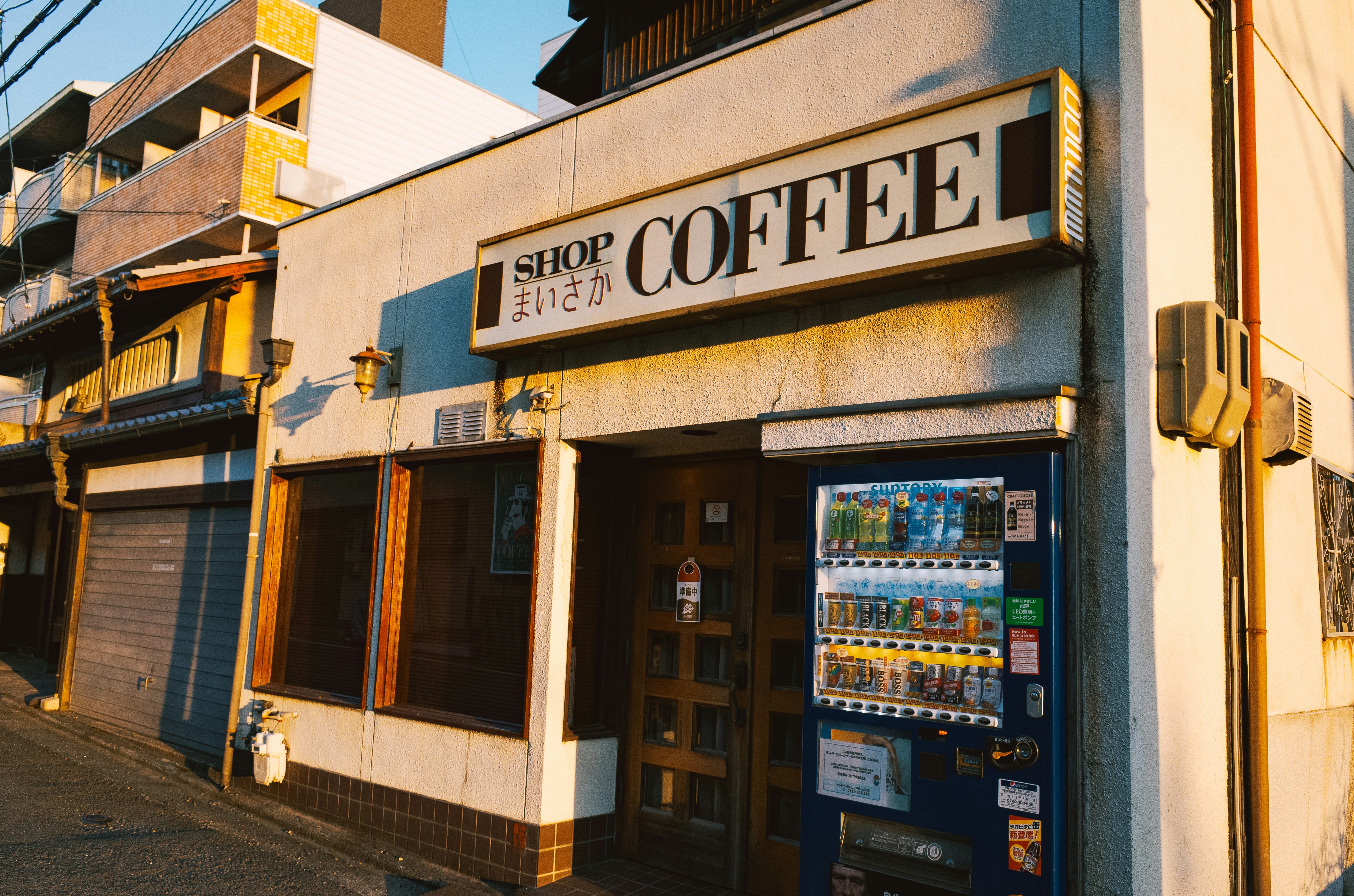 Shop Coffee: A Neon-Quiet Street Corner Café