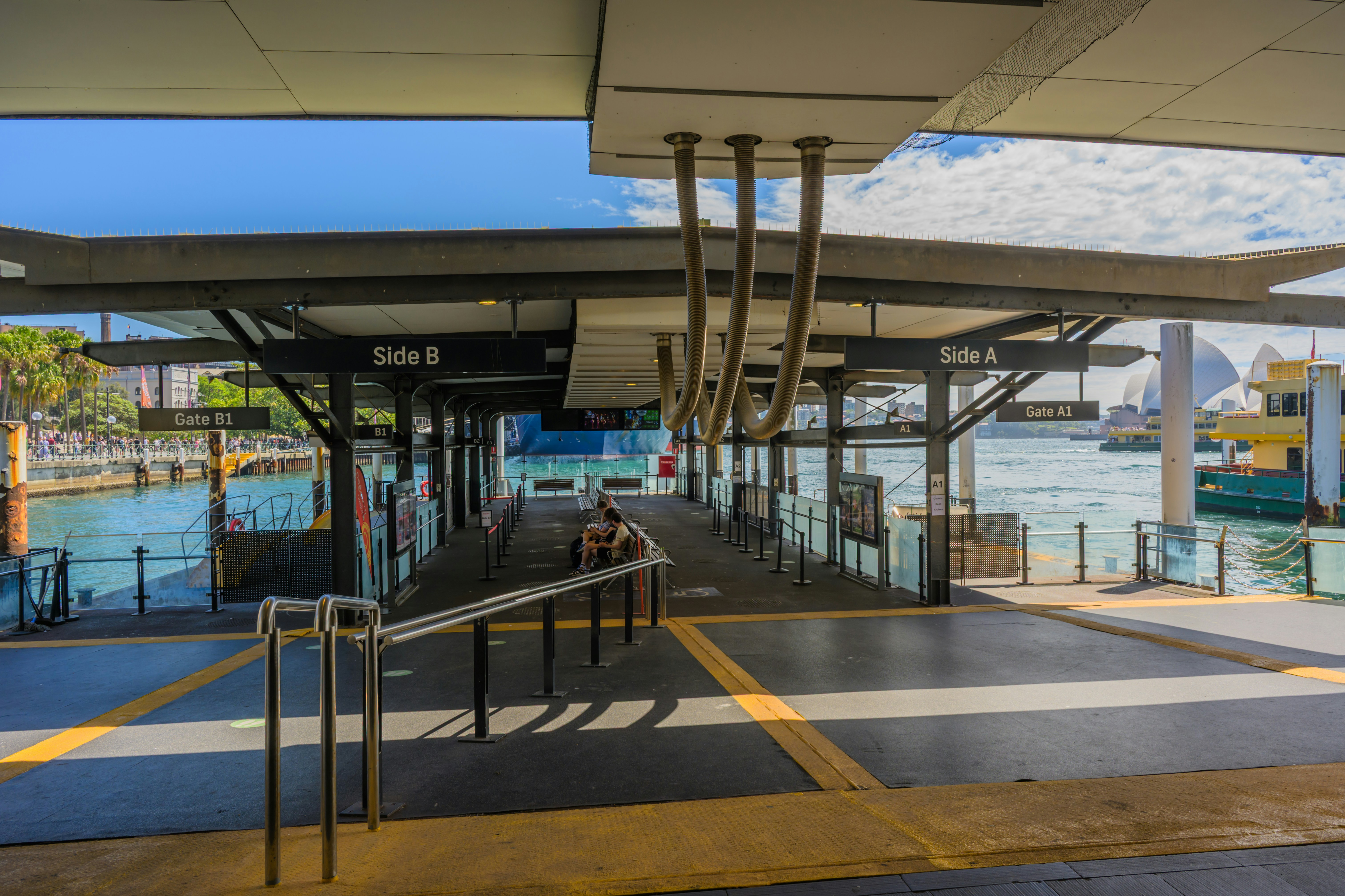 Dockside Transit: A Sunlit Pier to the Waterfront